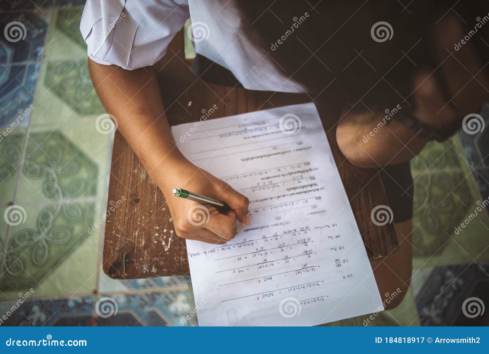 Students Writing Pen in Hand Doing Exams Answer Sheets Exercises in ...