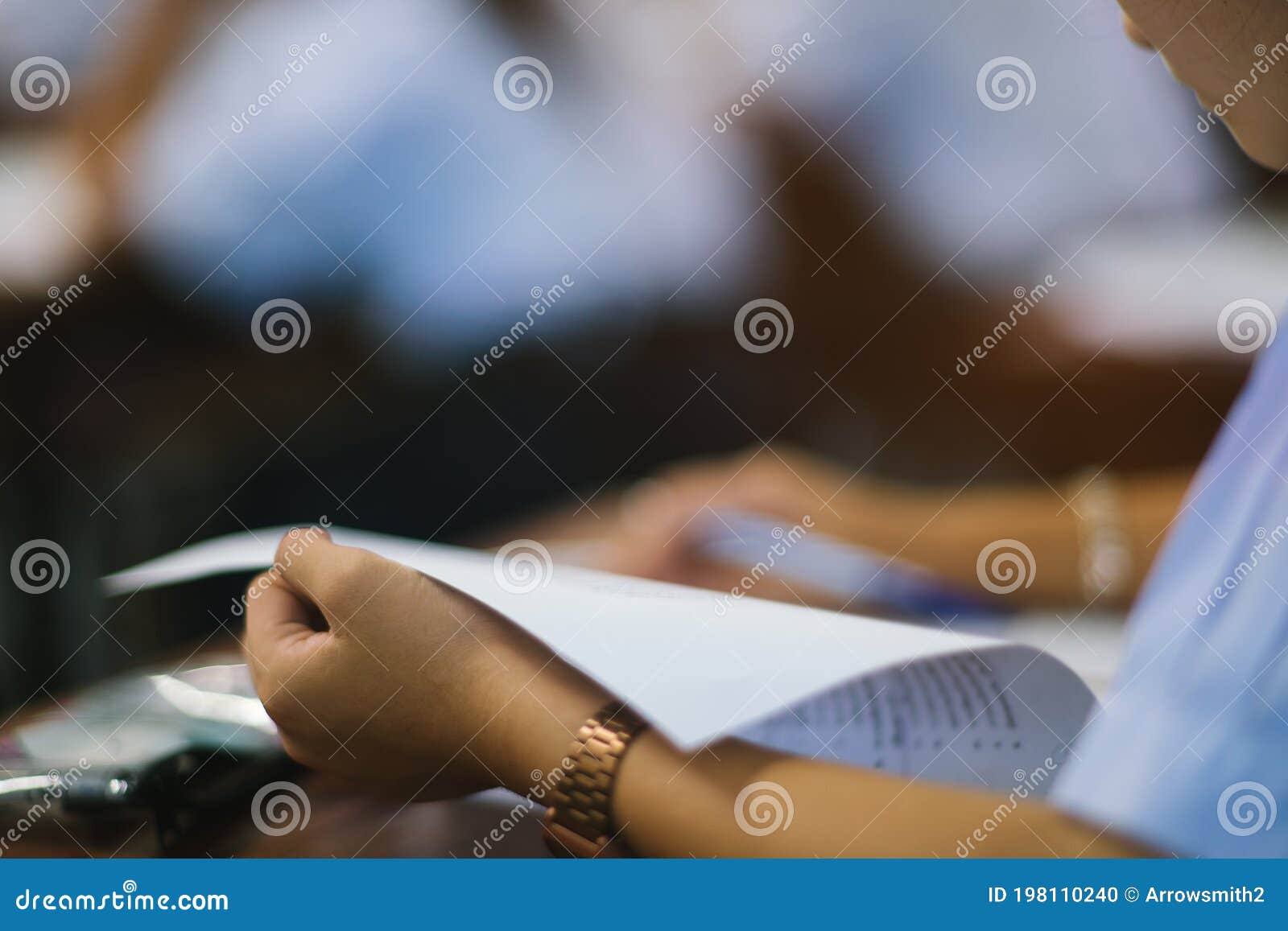 Students Writing and Reading Exam Answer Sheets Exercises in Classroom ...