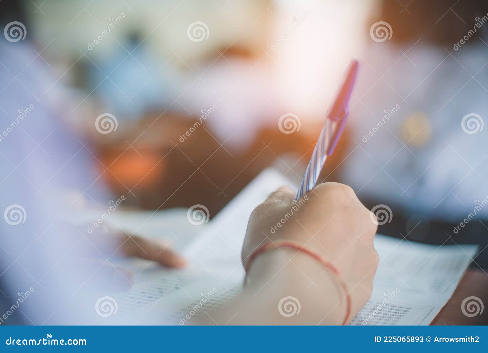 Students Writing and Reading Exam Answer Sheets Exercises in Classroom ...
