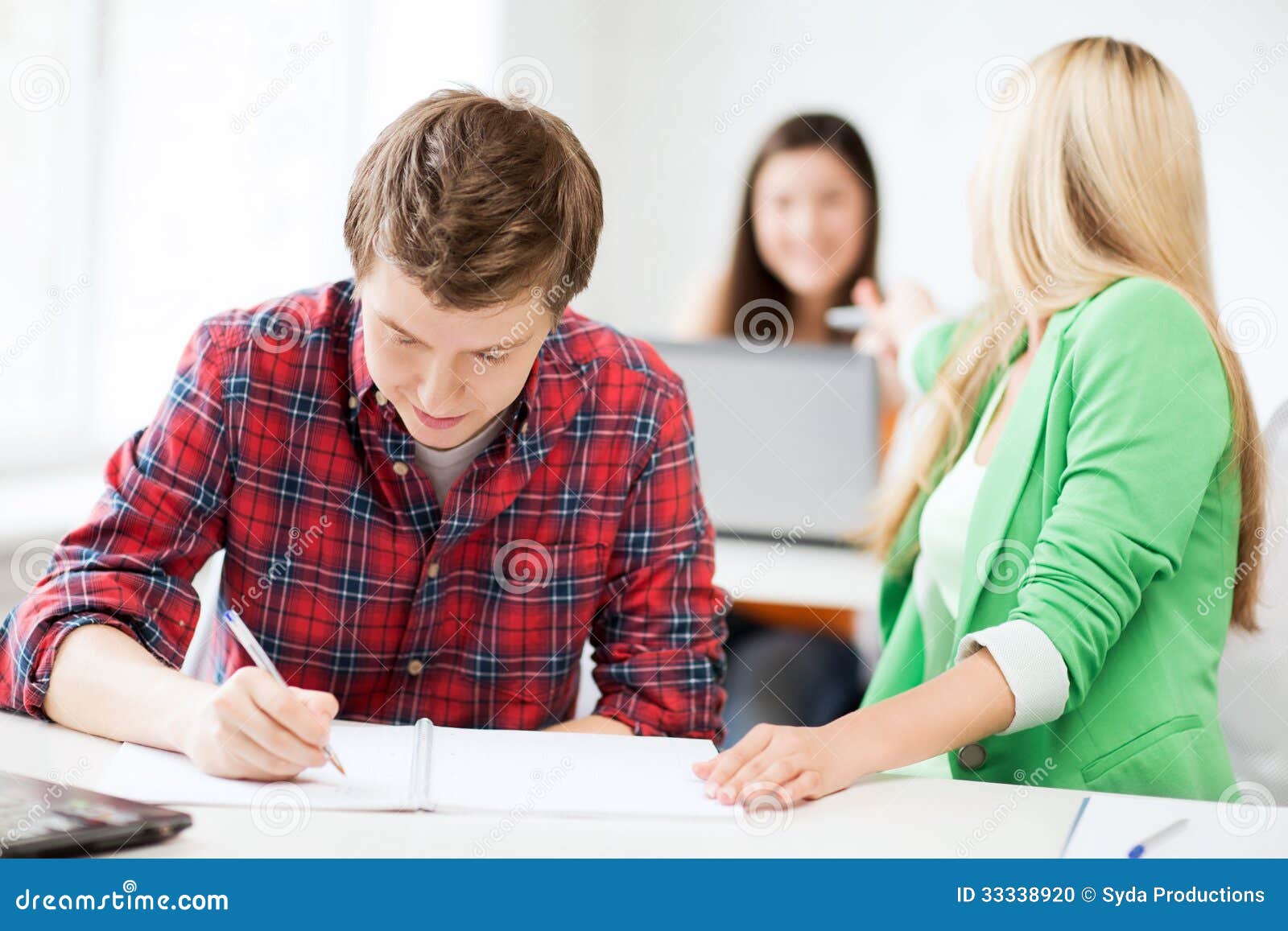 Students Writing Something at School Stock Photo - Image of handsome ...