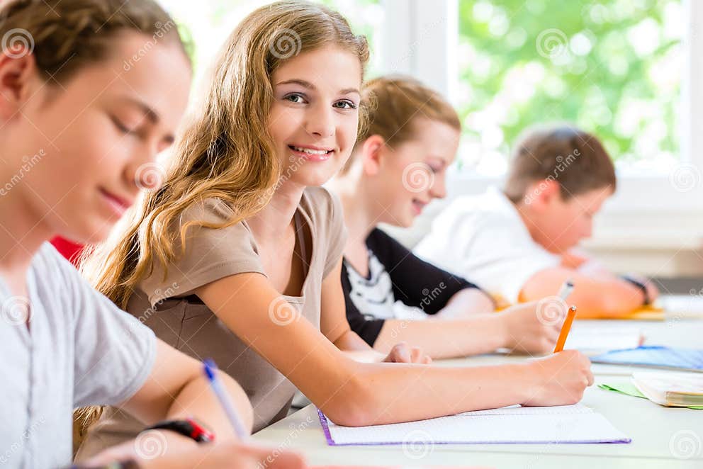 Students Writing a Test in School Concentrating Stock Photo - Image of ...