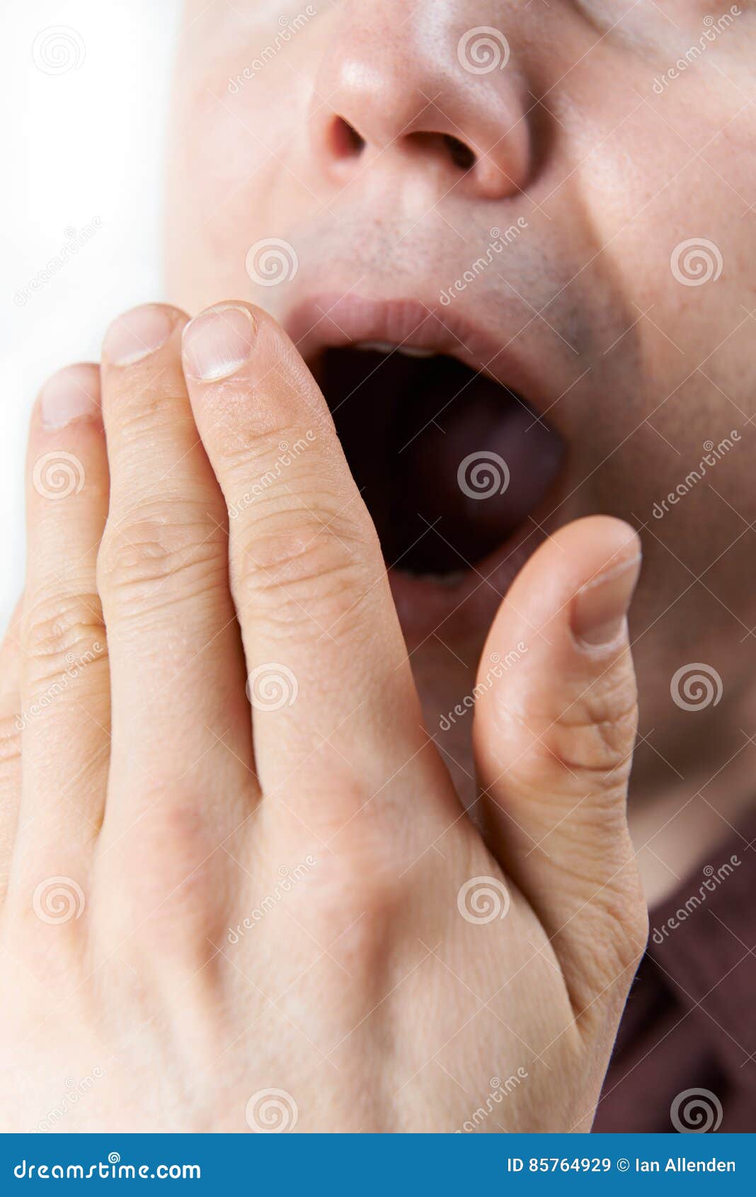 Studio Close Up of Man Yawning Stock Image - Image of illness, fatigue ...