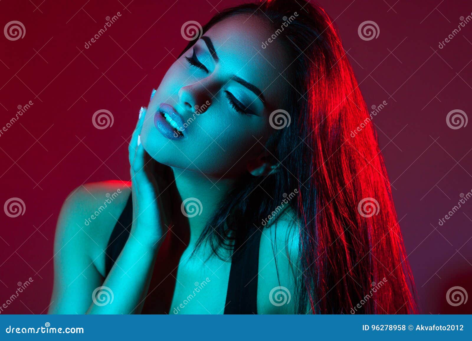 Studio Creative Portrait of a Beautiful Model Girl. Brunette in Red and ...