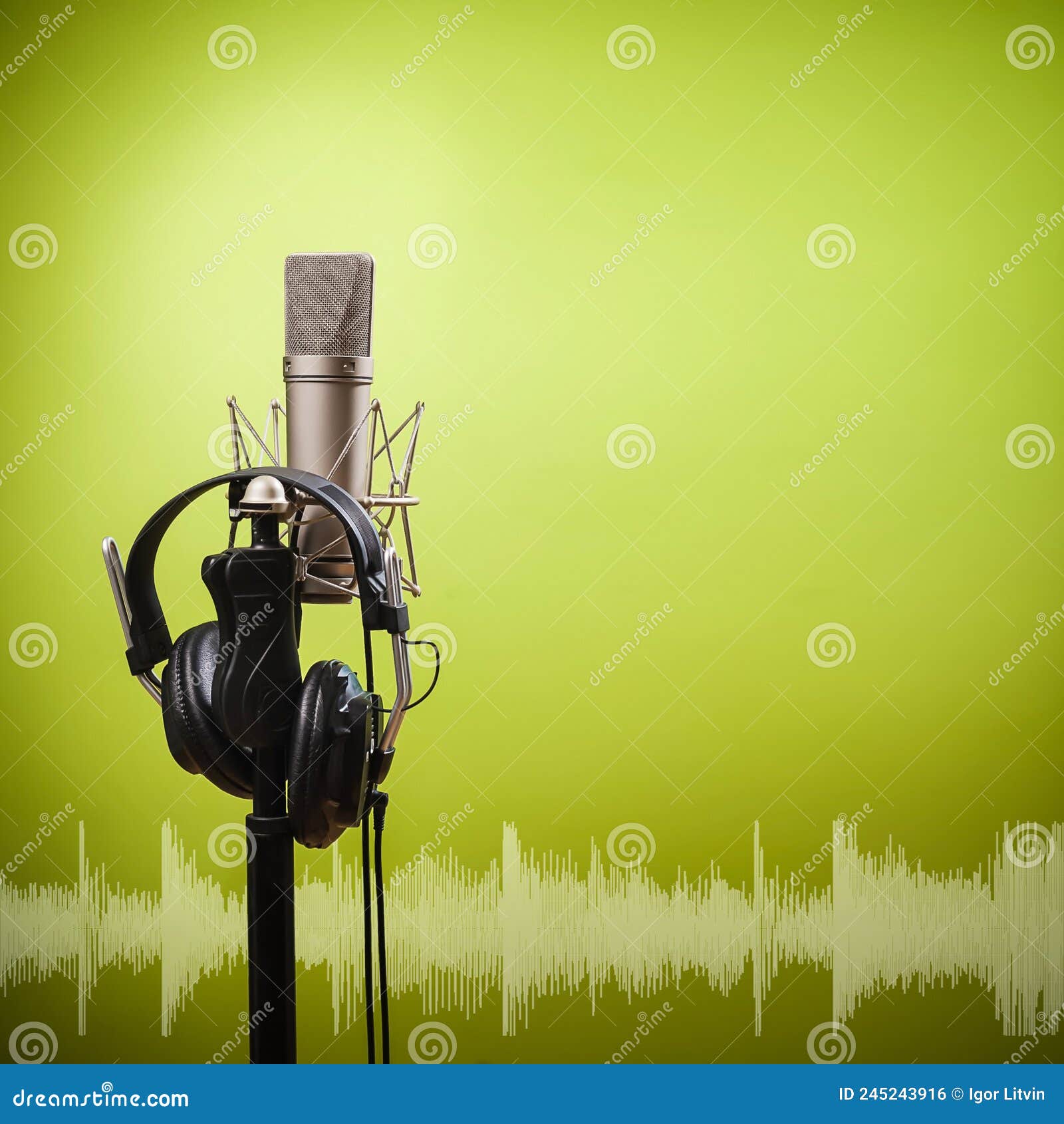 Studio Microphone and Headphones on a Green Background Stock Photo ...