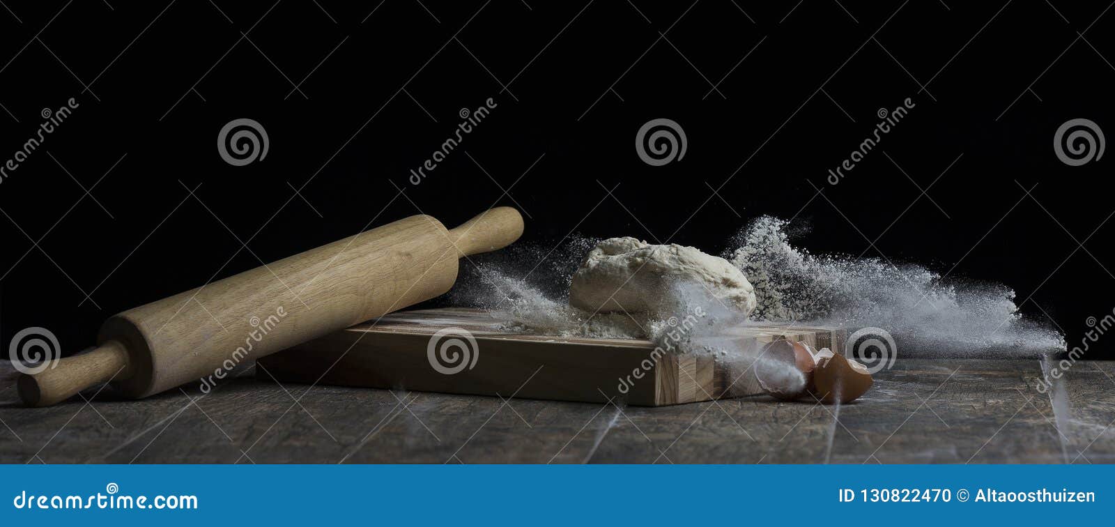 Studio Photo of a Ball of Bread Dough Falling on Flour with Roll Stock ...