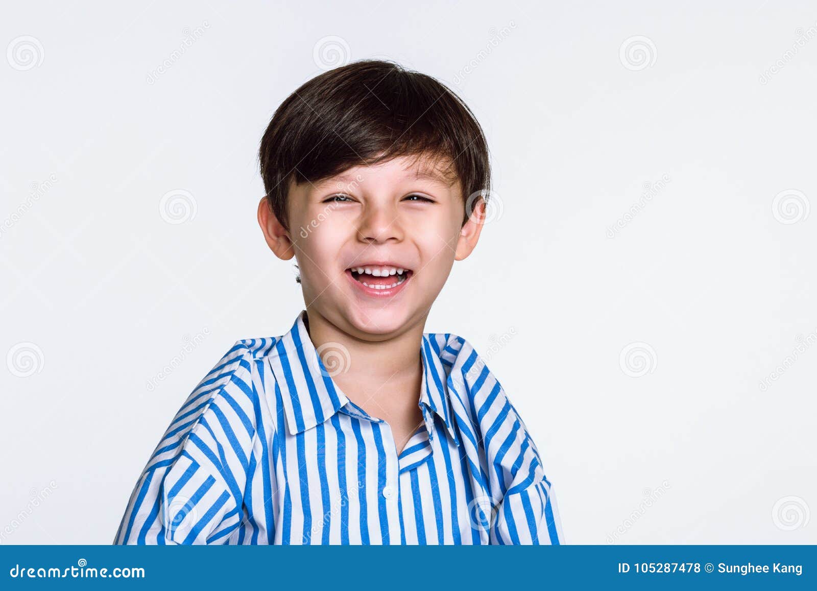 Studio Portrait of a Boy Smiling Happily Looking To the Side Stock ...