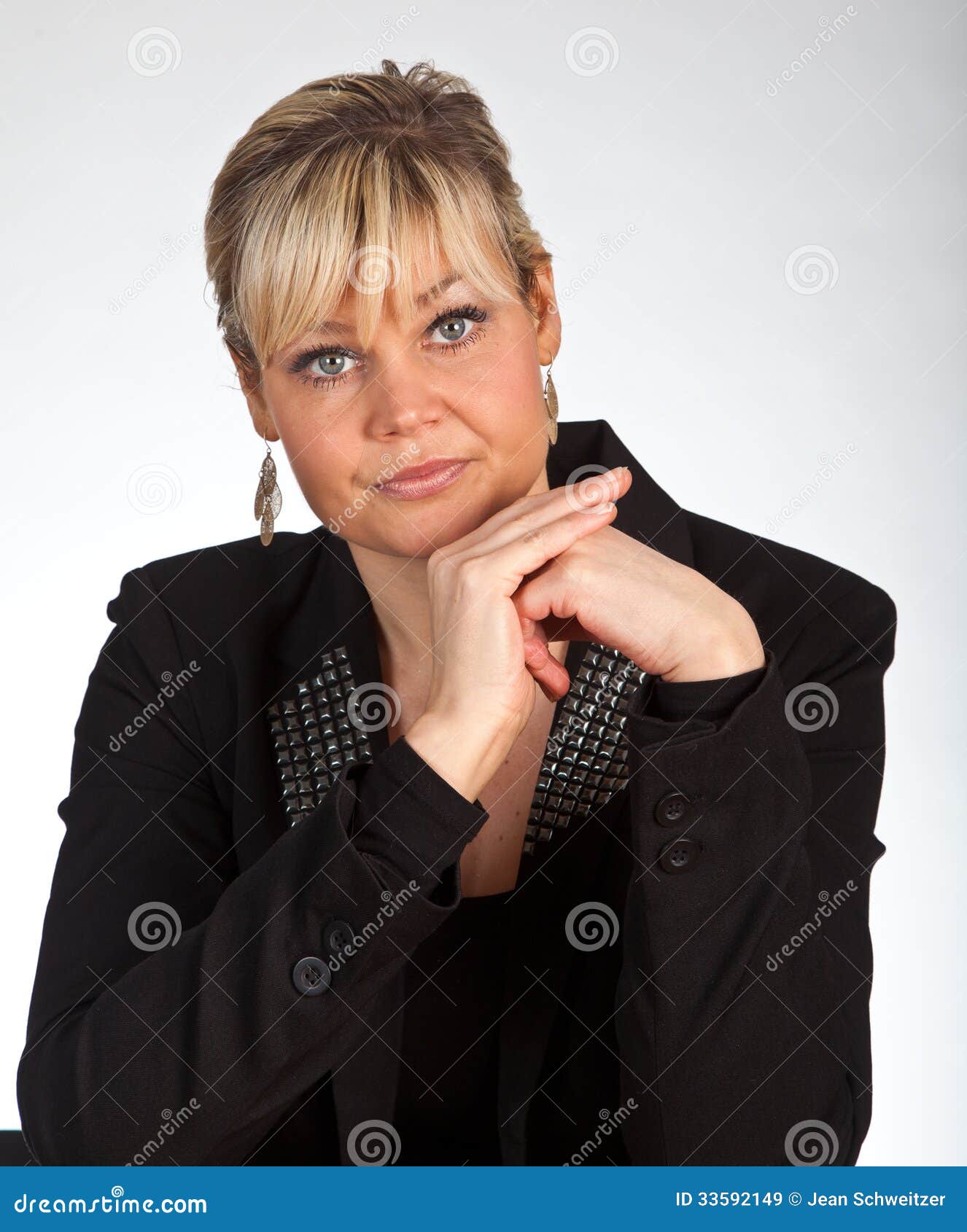 Studio Portrait of a Cute Blond Girl Looking in Front of Her Stock ...