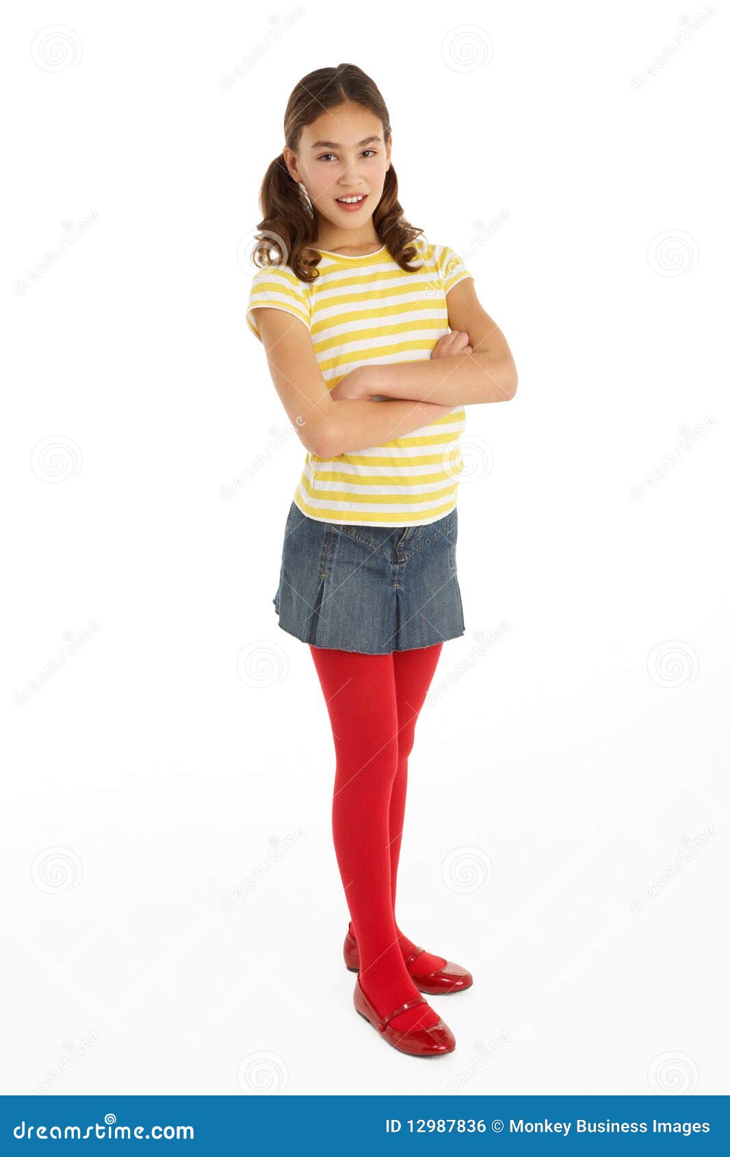 Studio Portrait of Defiant Young Girl Stock Photo - Image of girl ...