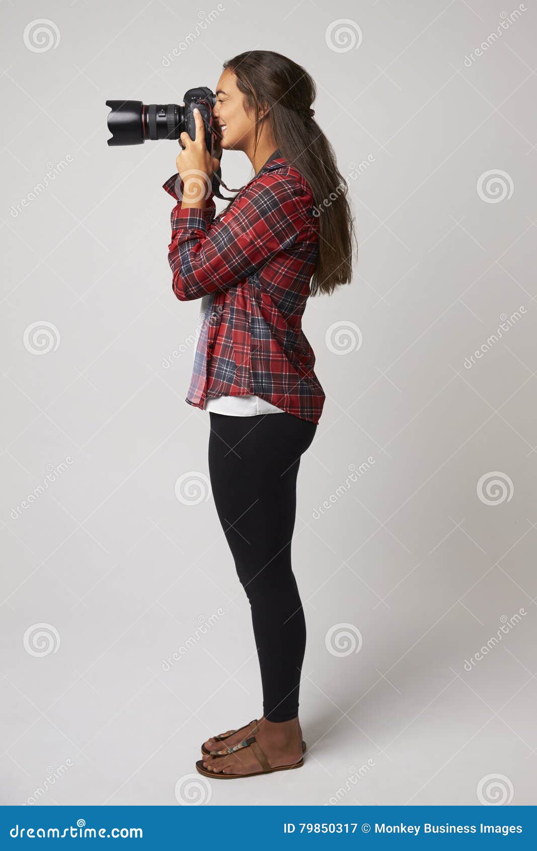 Studio Portrait of Female Photographer with Camera Stock Image - Image ...