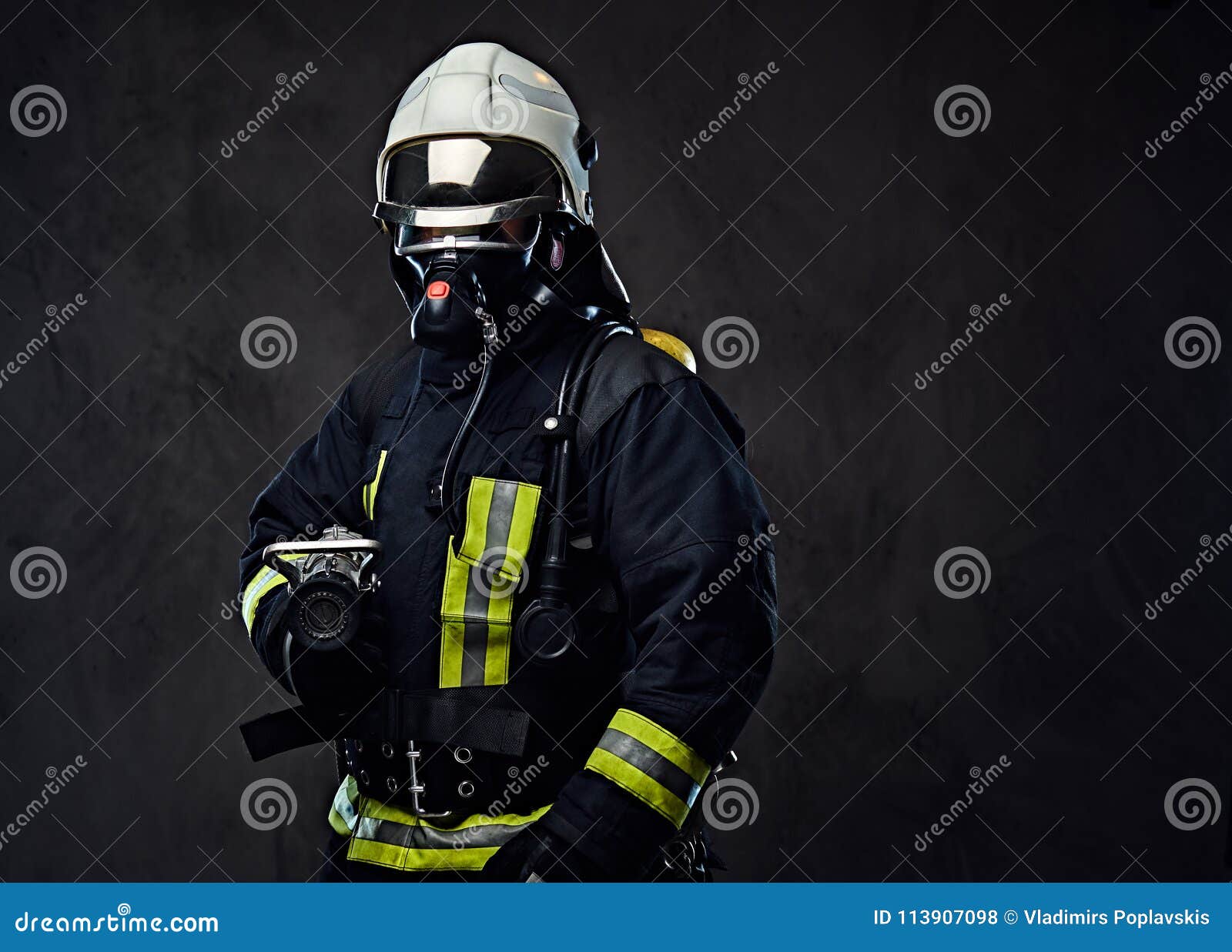 Firefighter Dressed in Uniform and an Oxygen Mask. Stock Photo - Image ...