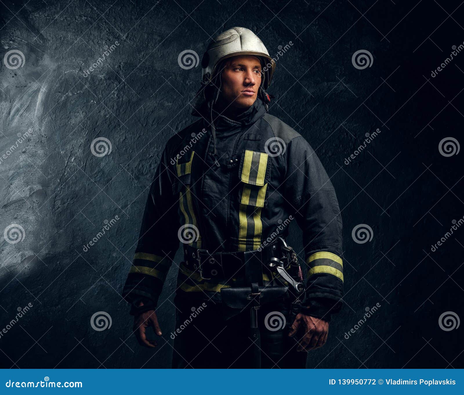 Portrait of Firefighter Dressed in Uniform and Safety Helmet Looking ...