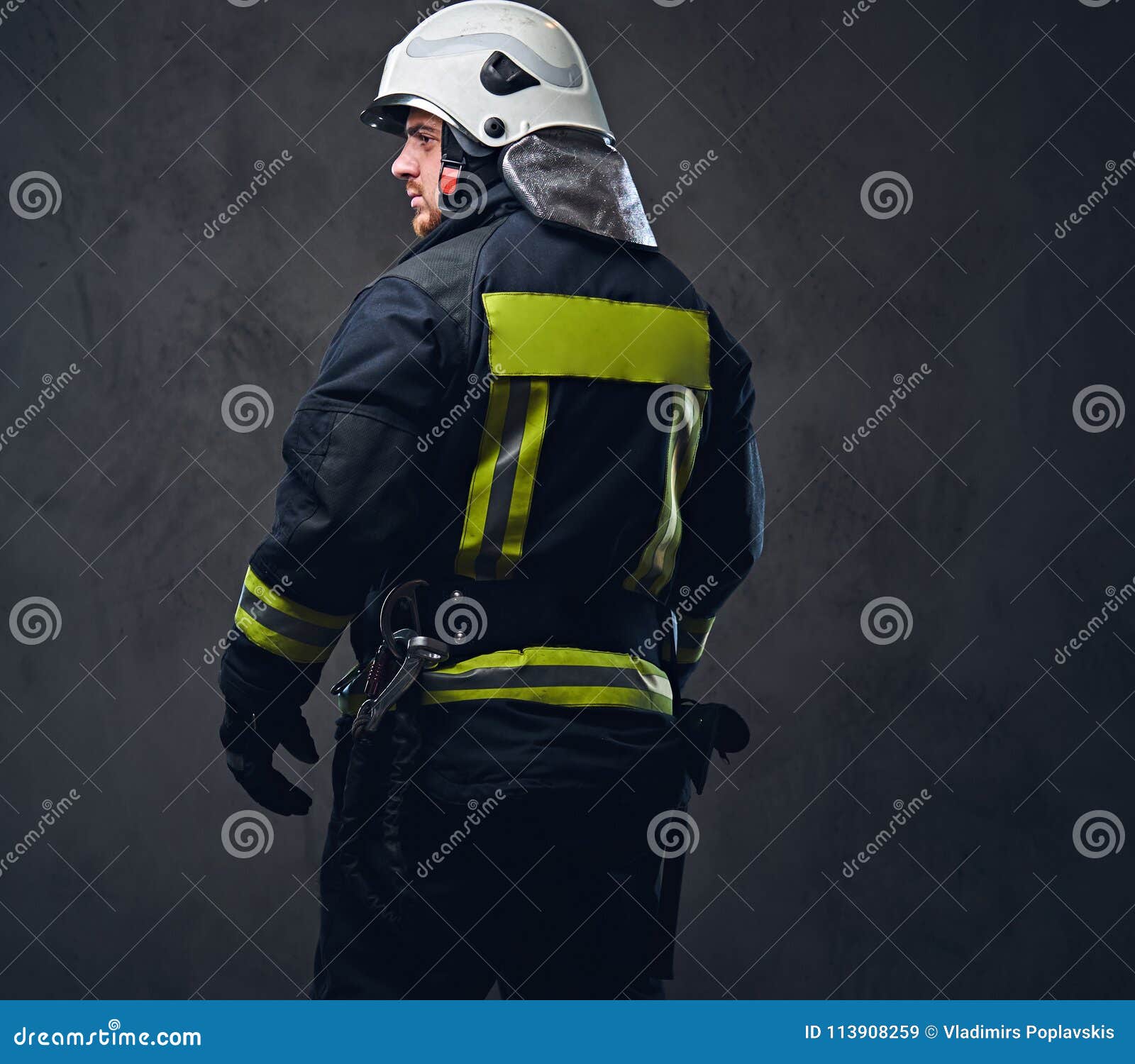 Studio Portrait of Firefighter Dressed in Uniform. Stock Image - Image ...