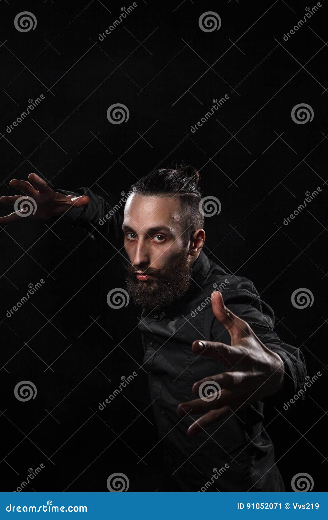 Studio Portrait of a Handsome Man with a Beard Practicing Kung F Stock ...