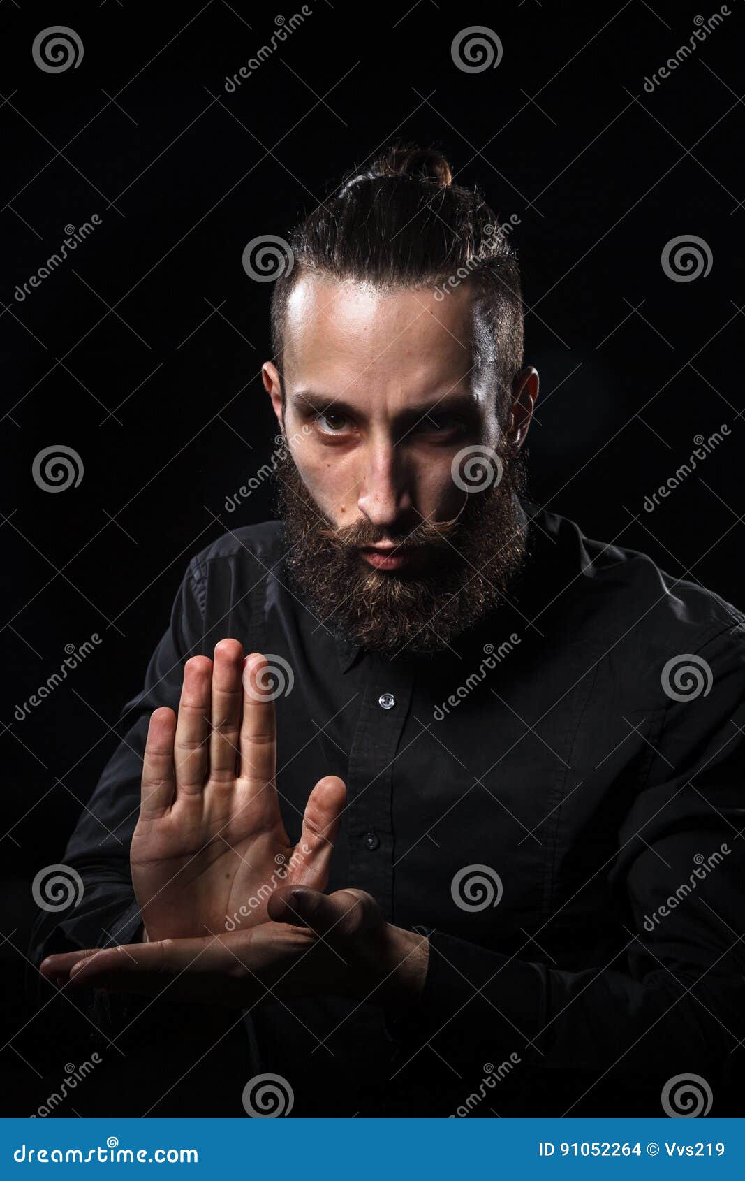 Studio Portrait of a Handsome Man with a Beard Practicing Kung F Stock ...