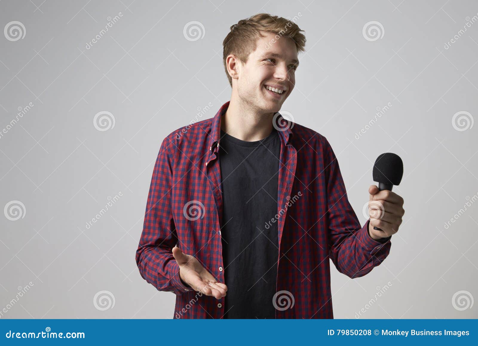 Studio Portrait of Male Journalist with Microphone Stock Photo - Image ...