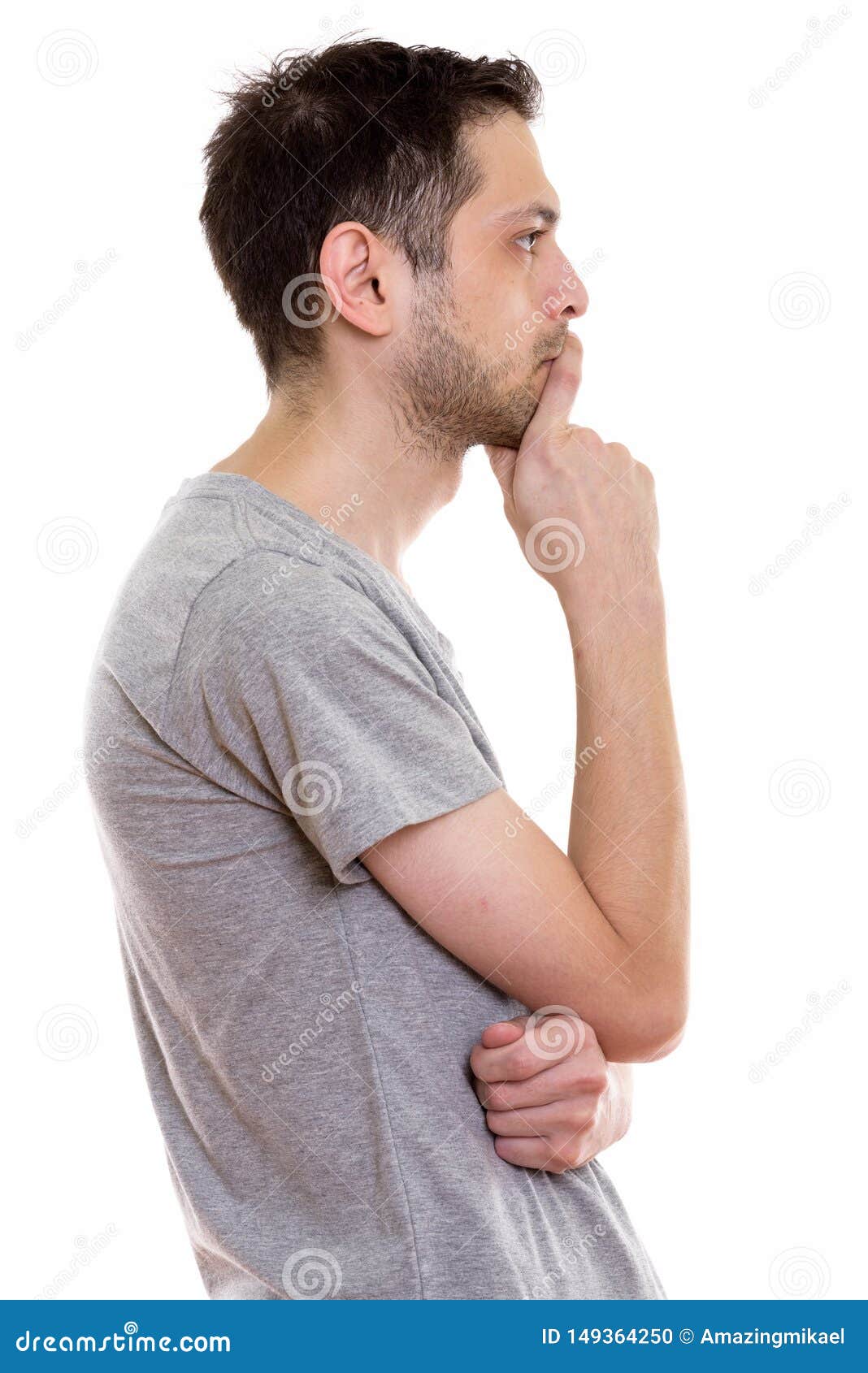 Profile View Portrait of Young Man Standing and Thinking Stock Photo ...