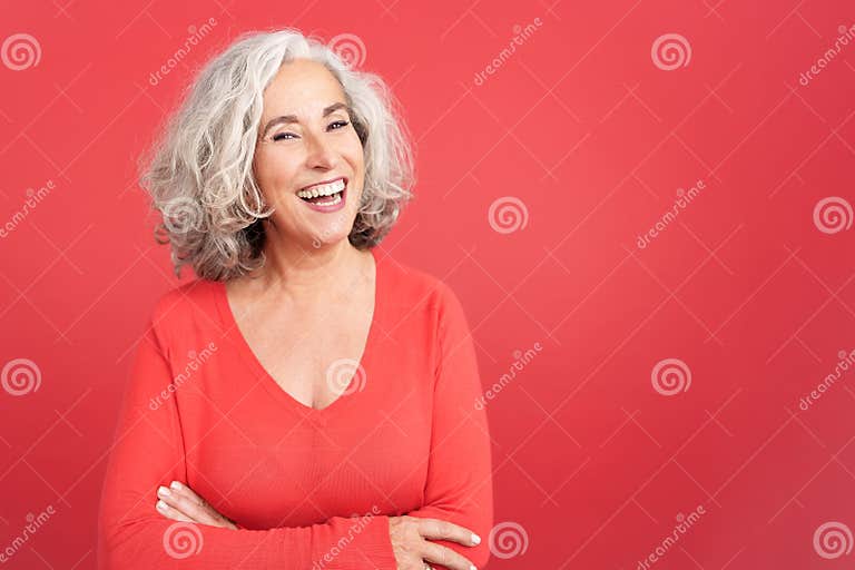 Mature Woman Laughing Standing With Arms Crossed Stock Image Image Of