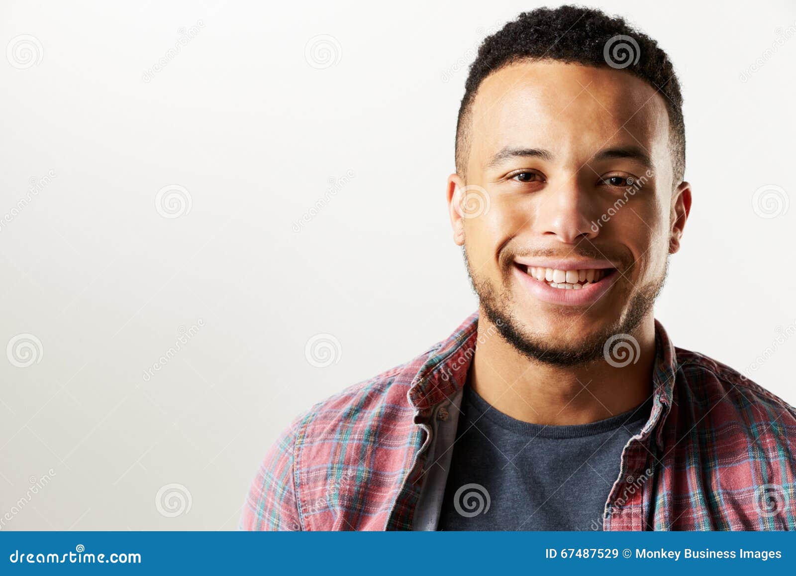 Studio Portrait of Smiling Man Against White Background Stock Image ...