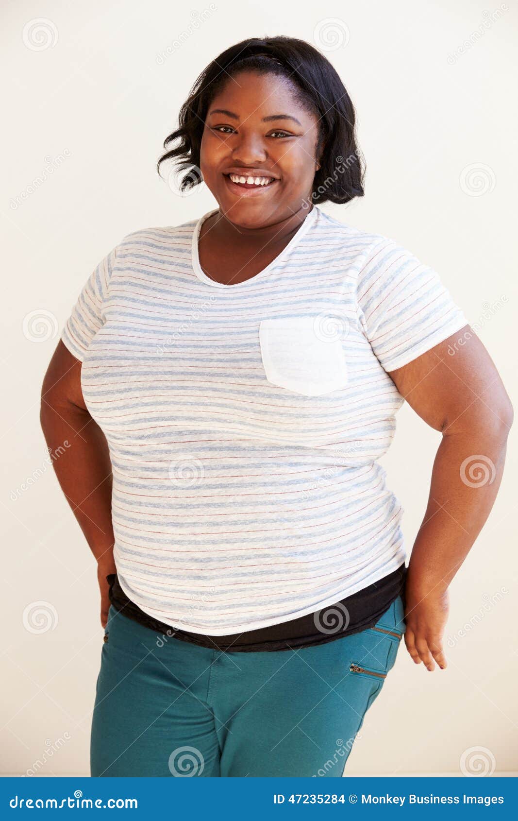 Studio Portrait of Smiling Overweight Woman Stock Photo - Image of ...