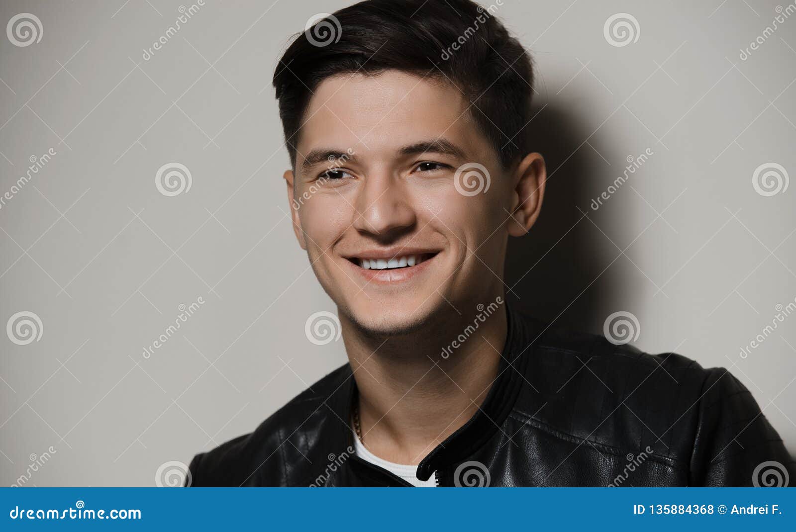 Studio Portrait of Smiling Young Modern Guy Stock Photo - Image of ...