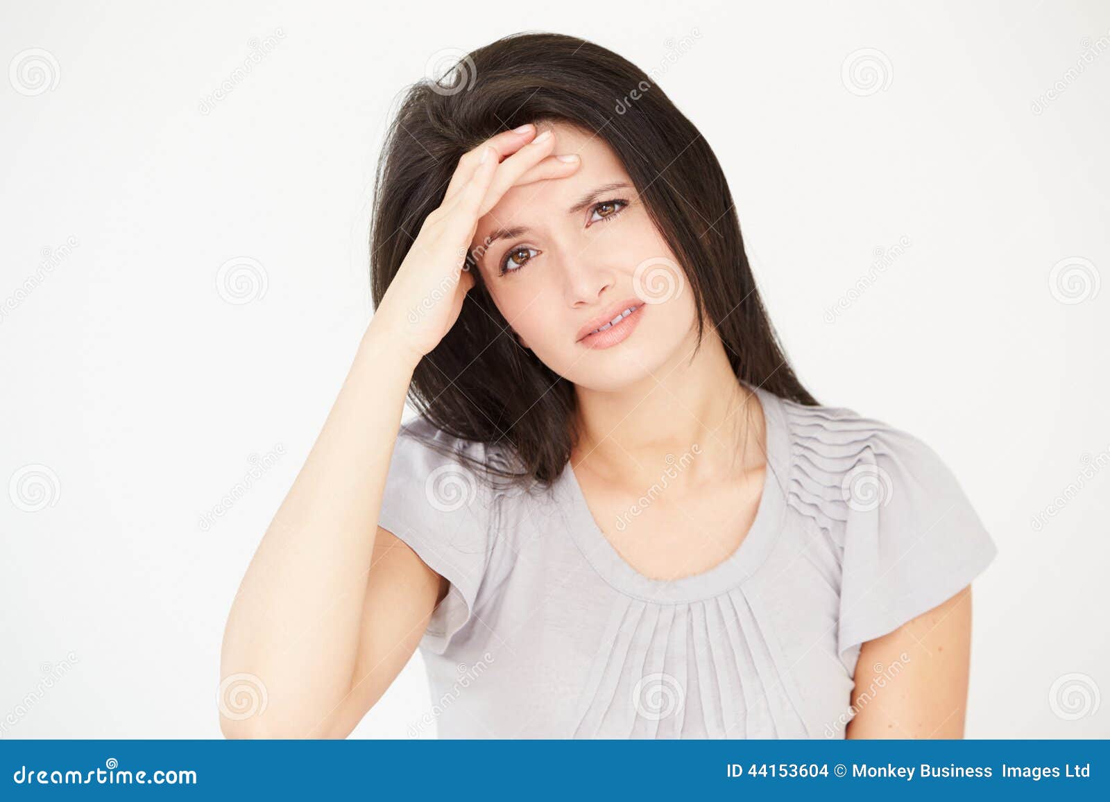 Studio Portrait of Stressed Woman Against White Background Stock Photo ...