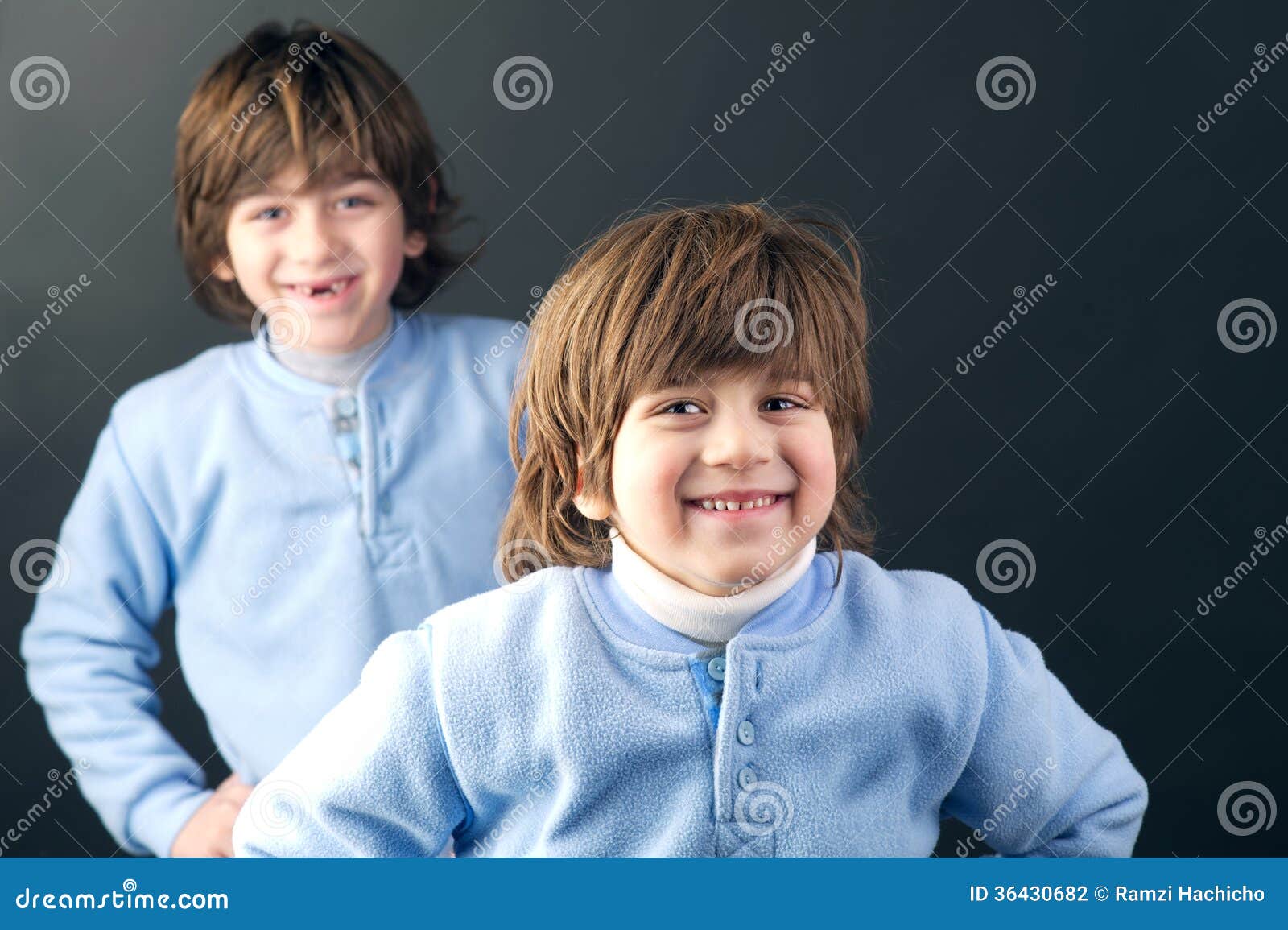Studio Portrait of Two Young Brothers Posing Stock Photo - Image of ...