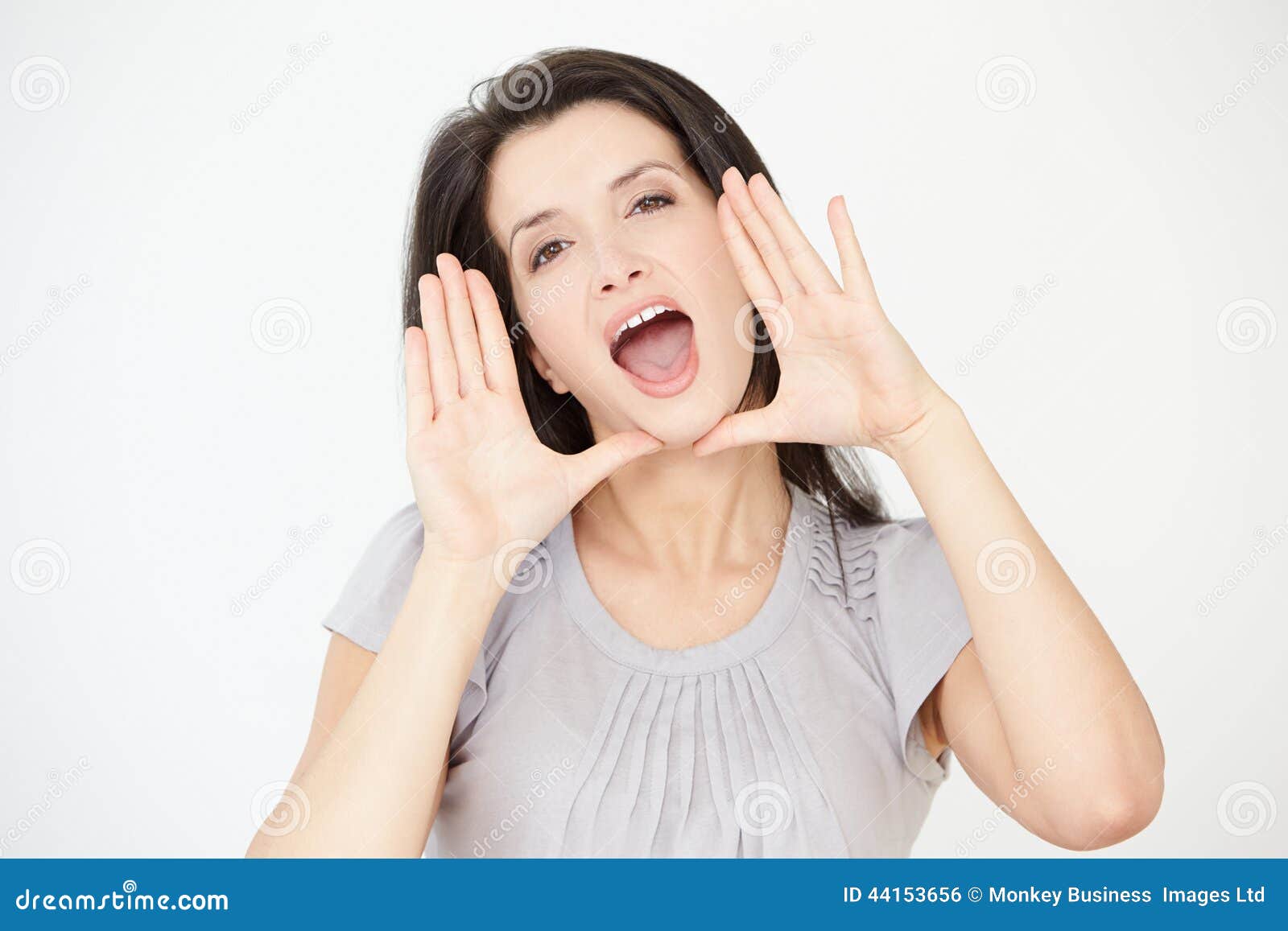Studio Portrait of Woman Shouting Towards Camera Stock Photo - Image of ...
