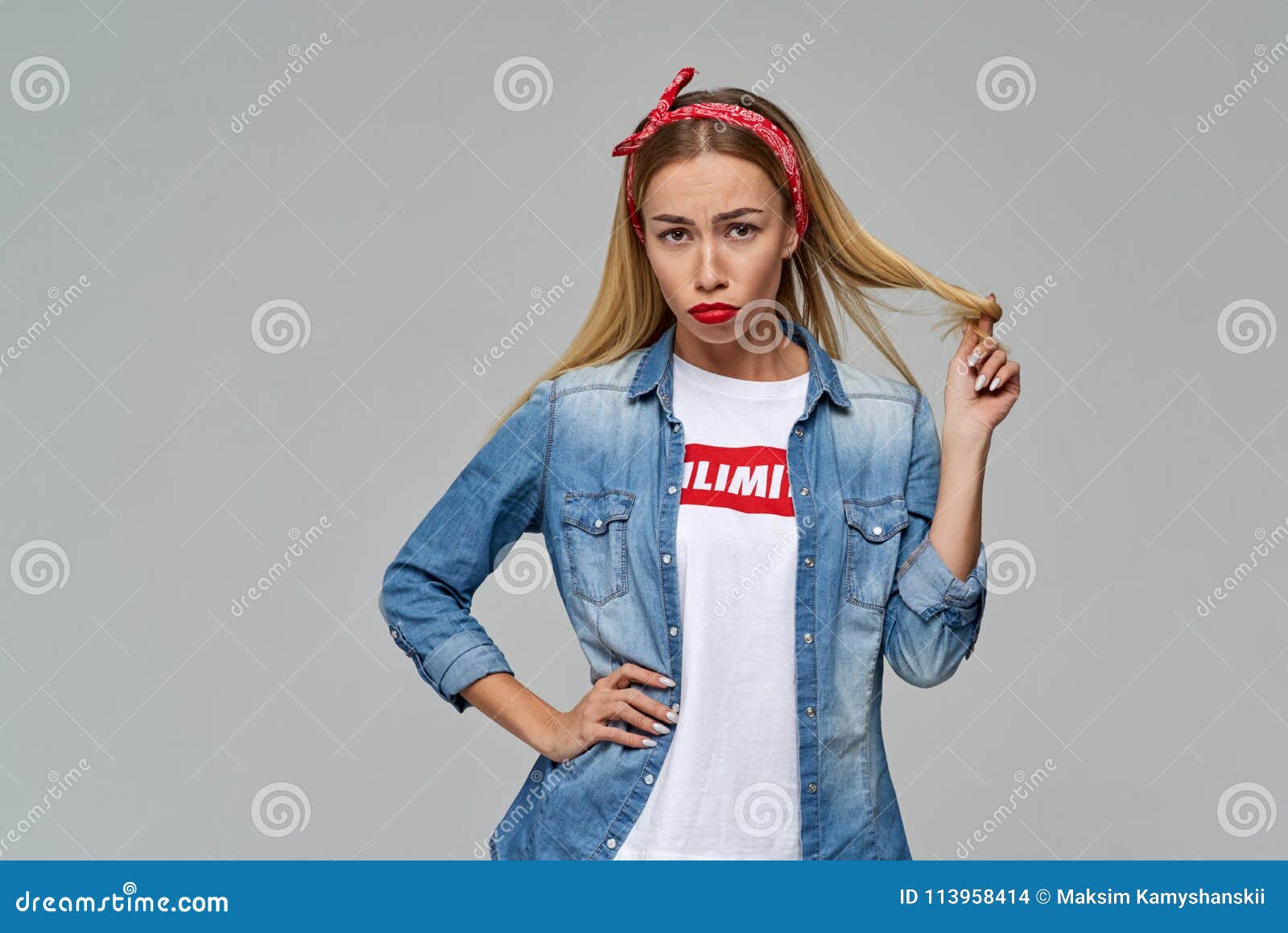 Studio Portrait of a Young Attractive Woman with a Upset Expression ...