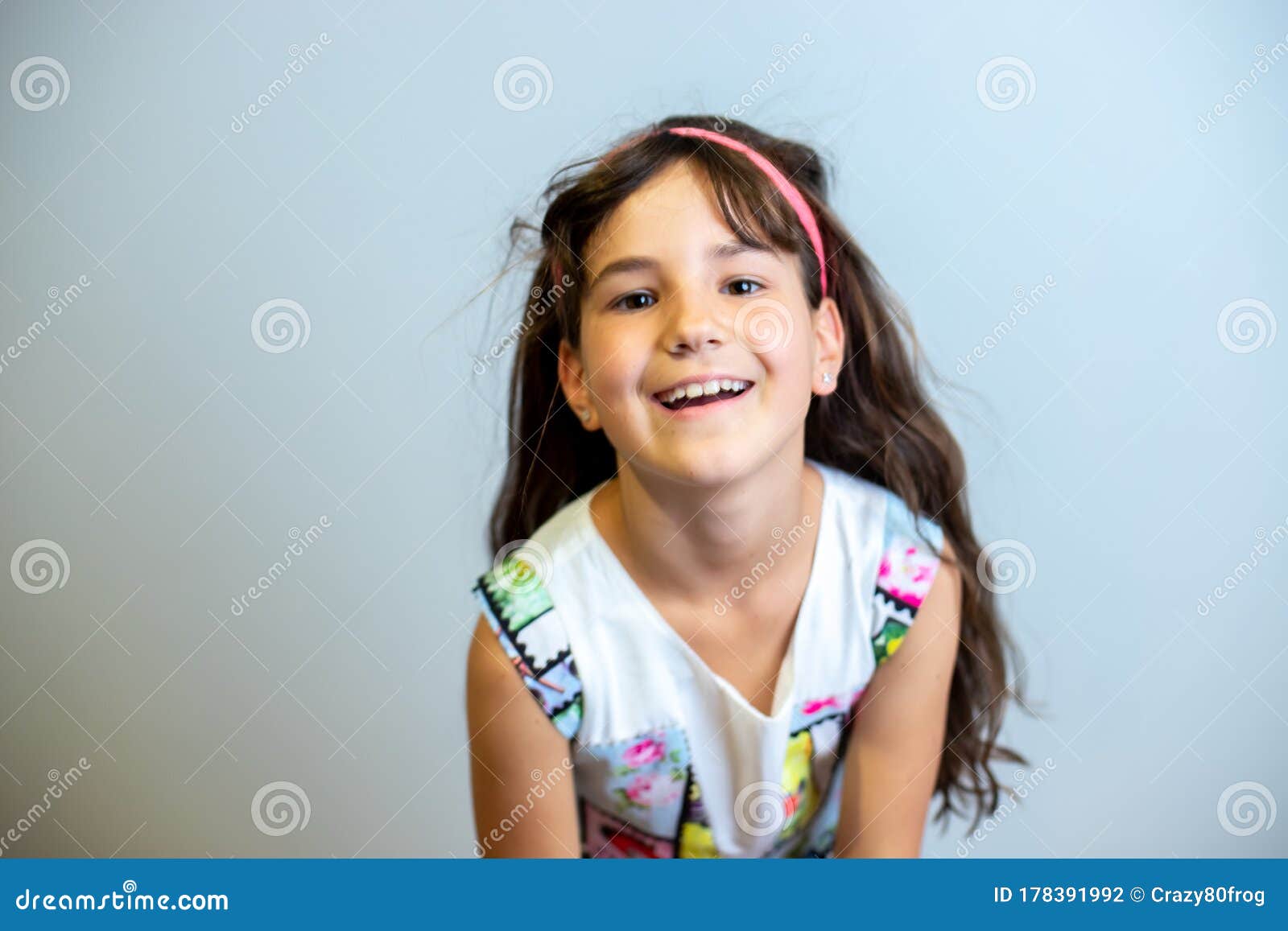 Studio Portrait of Young Child Girl Making Faces Stock Photo - Image of ...