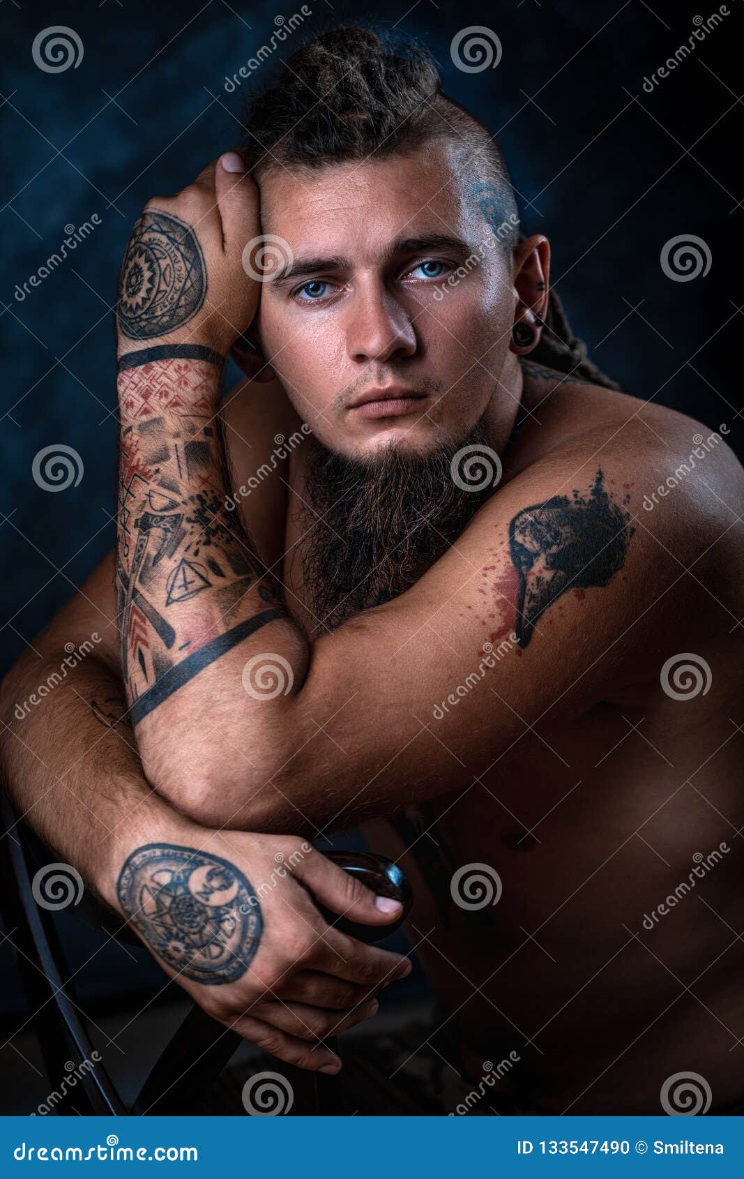 Studio Portrait of a Young Man with Tattoos Stock Photo - Image of ...