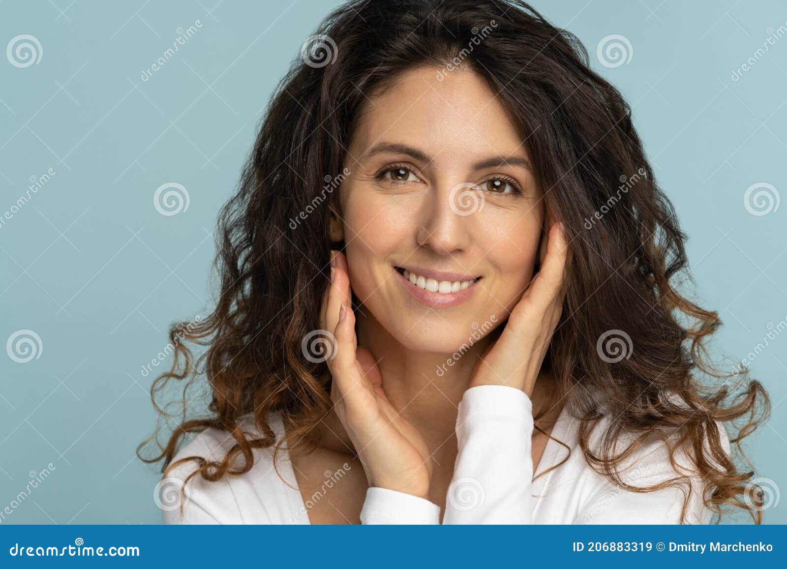 Young Woman With Natural Makeup Curly Hair Touching Well Groomed Pure