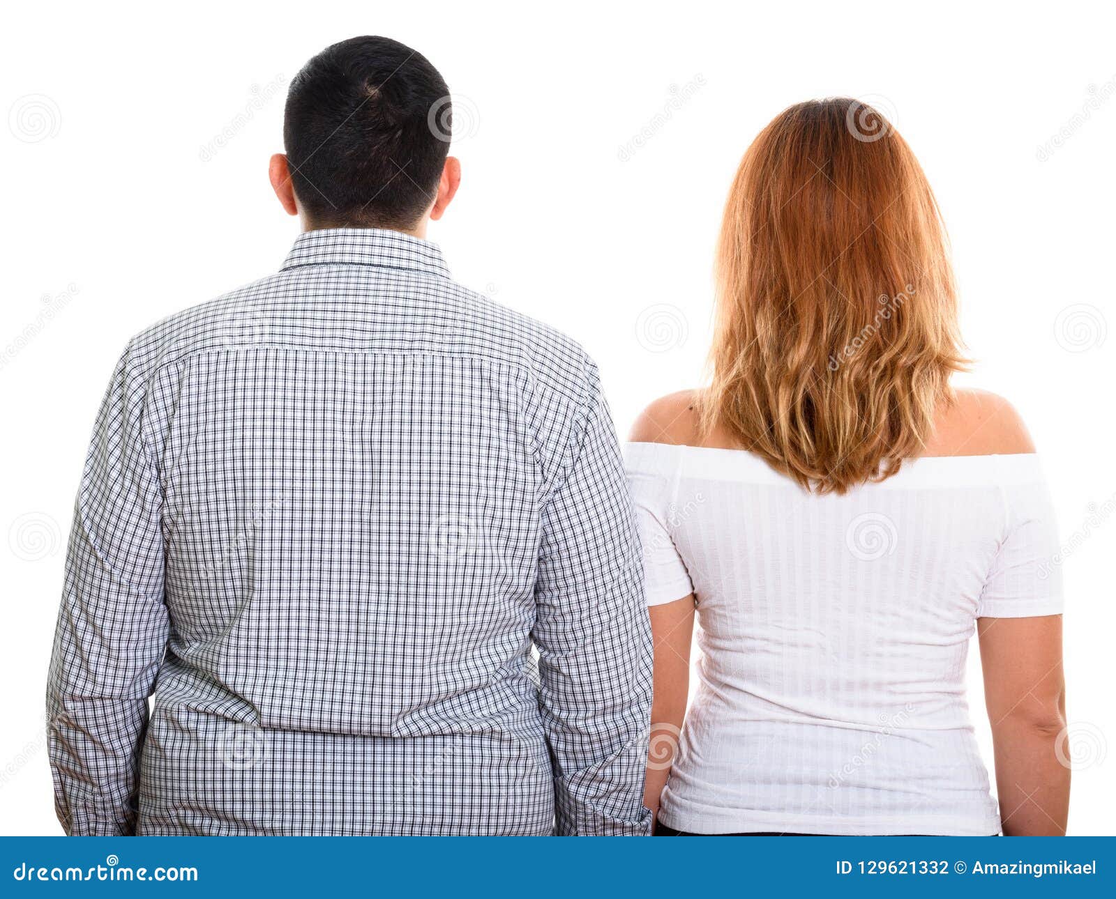 Studio Shot of Back View of Young Hispanic Couple Stock Photo - Image ...