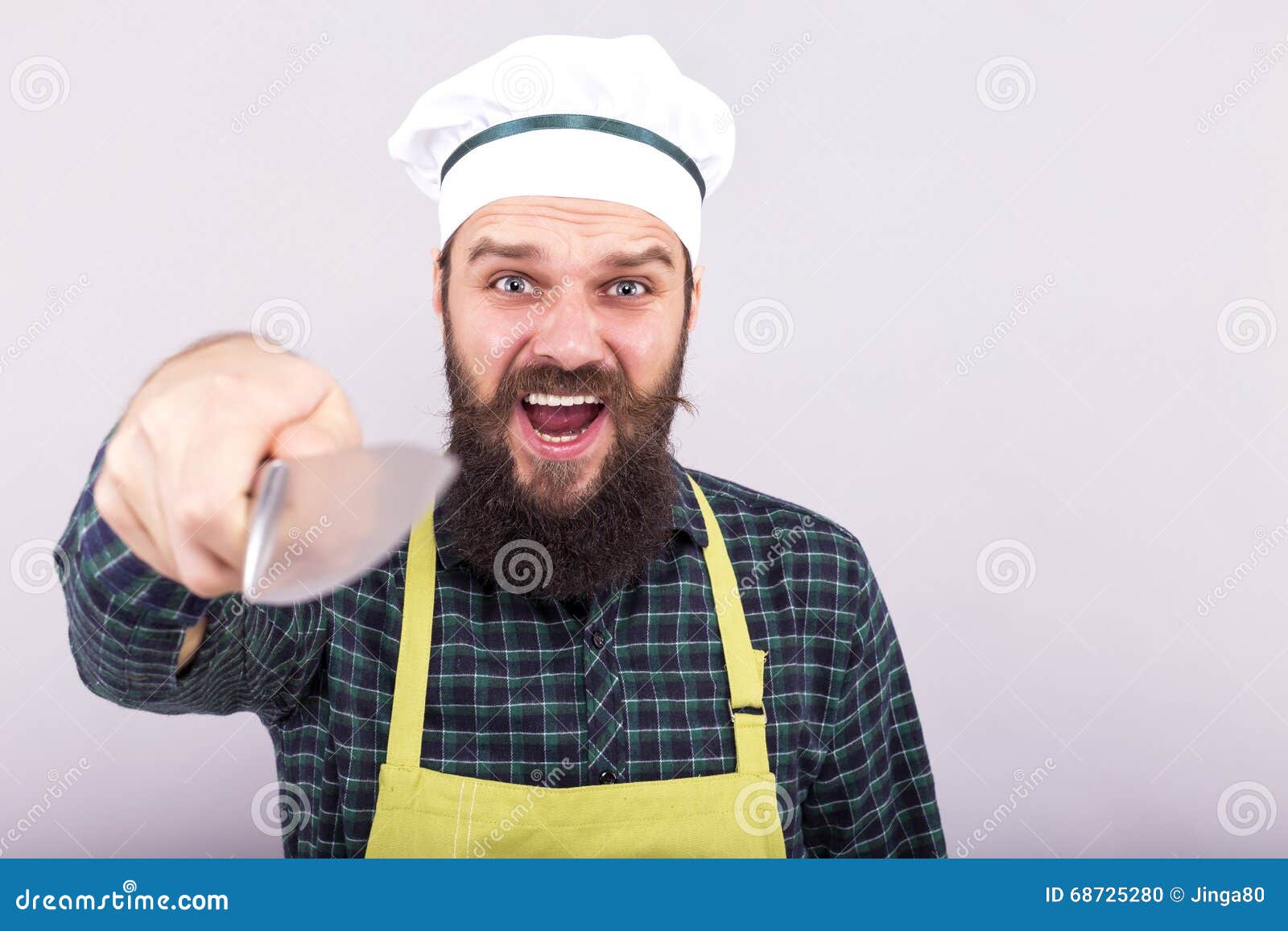 Bearded Man With A Ham Knife Ready To Cut A Piece Of Typical Spanish ...