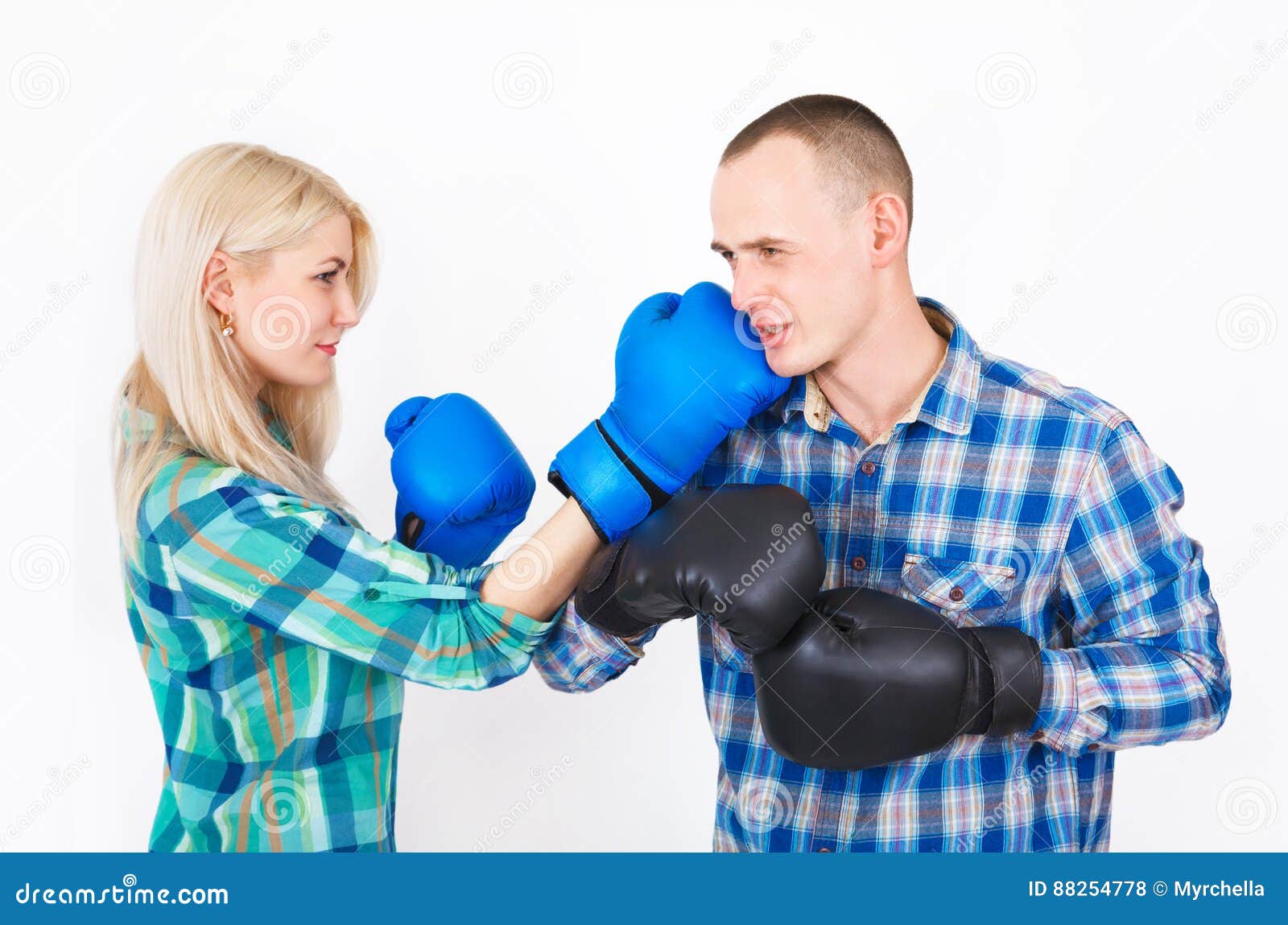 Studio Shot of a Beautiful Funny Couple Expressive Fighting. Stock ...