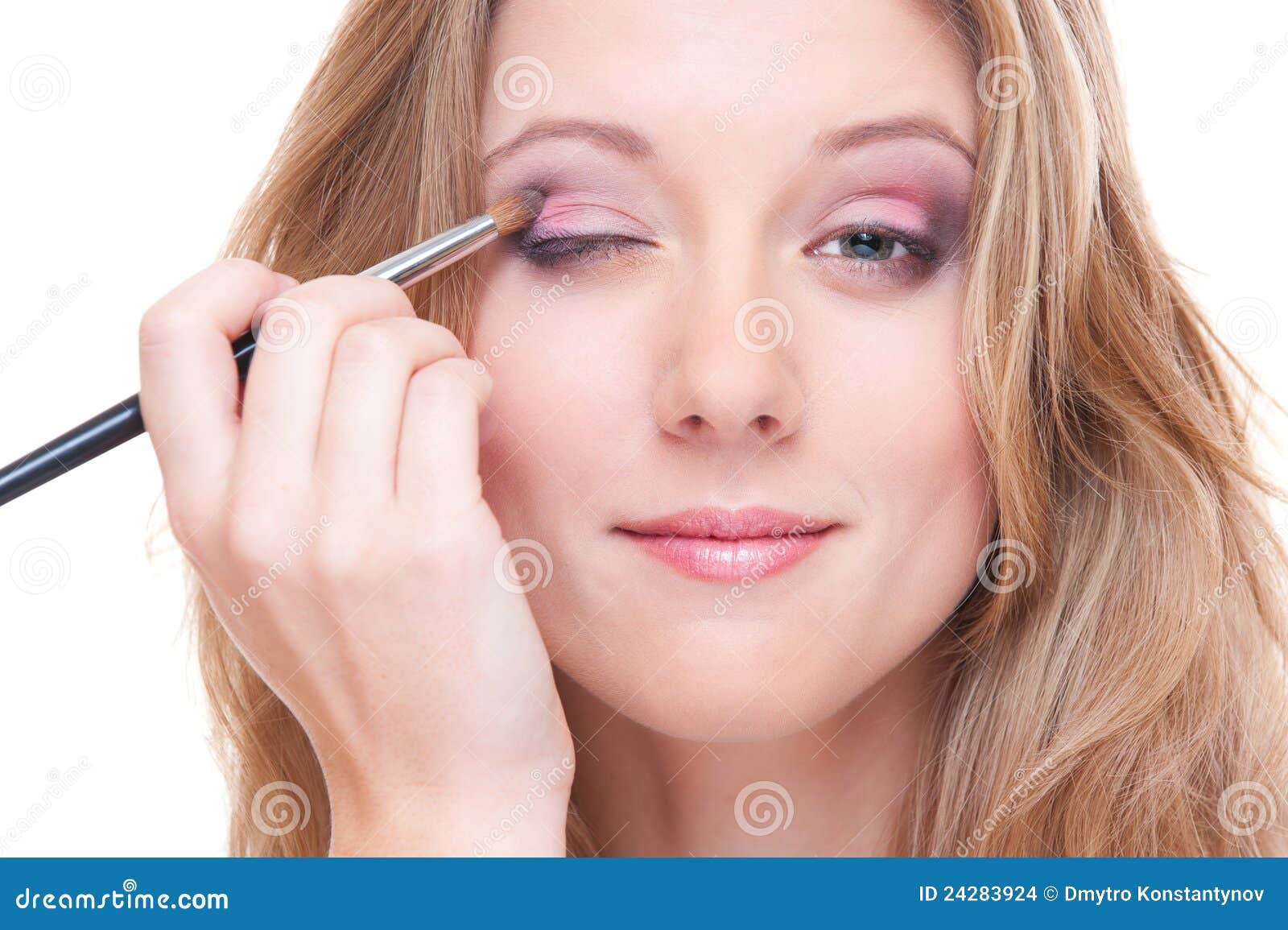 Studio Shot of Beautiful Young Woman Doing Make Up Stock Photo - Image ...