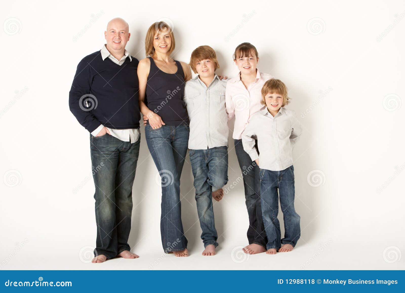 Studio Shot of Family Group Standing in Studio Stock Photo - Image of ...