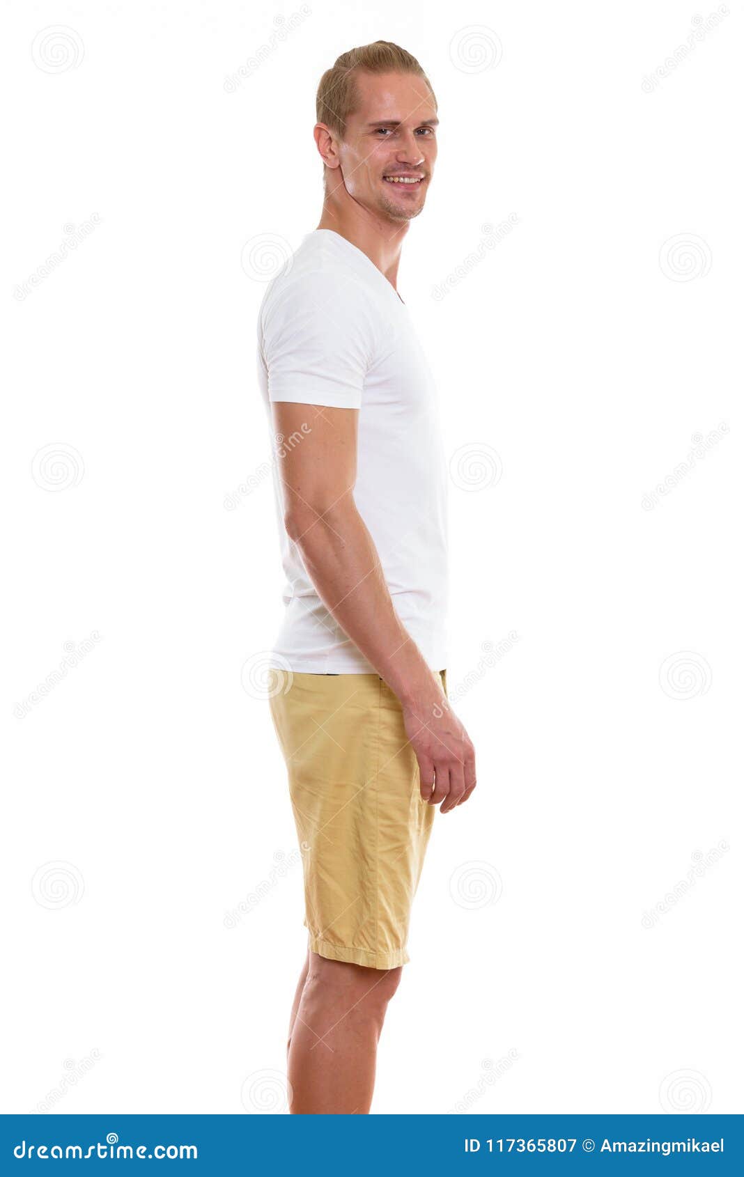 Studio Shot Of Happy Young Handsome Man Smiling And Standing Stock ... Studio Shot Of Happy Young Handsome Man Smiling And Standing Stock ...