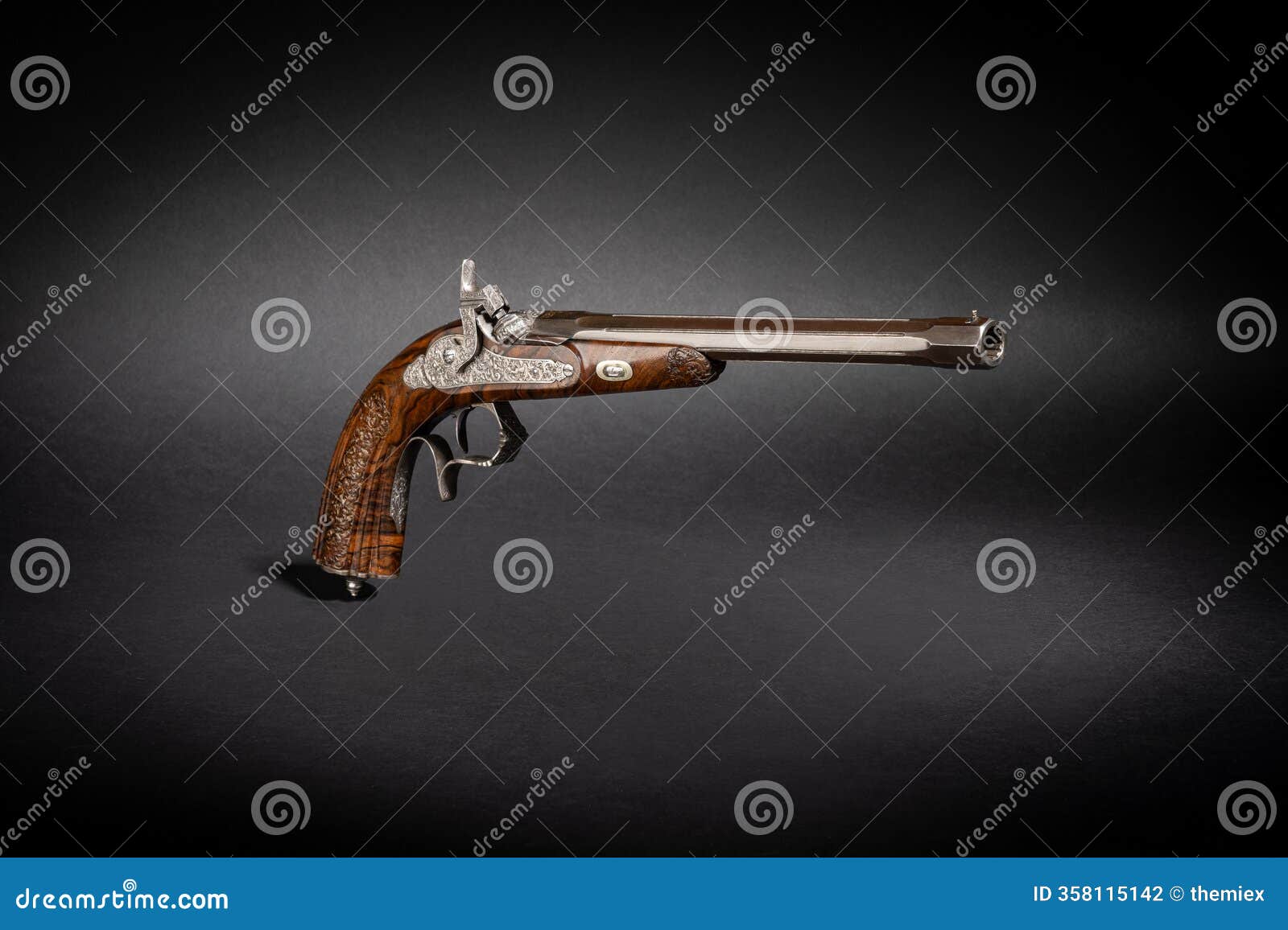 Studio Shot of a Historical Percussion Disc Pistol on Black Background ...