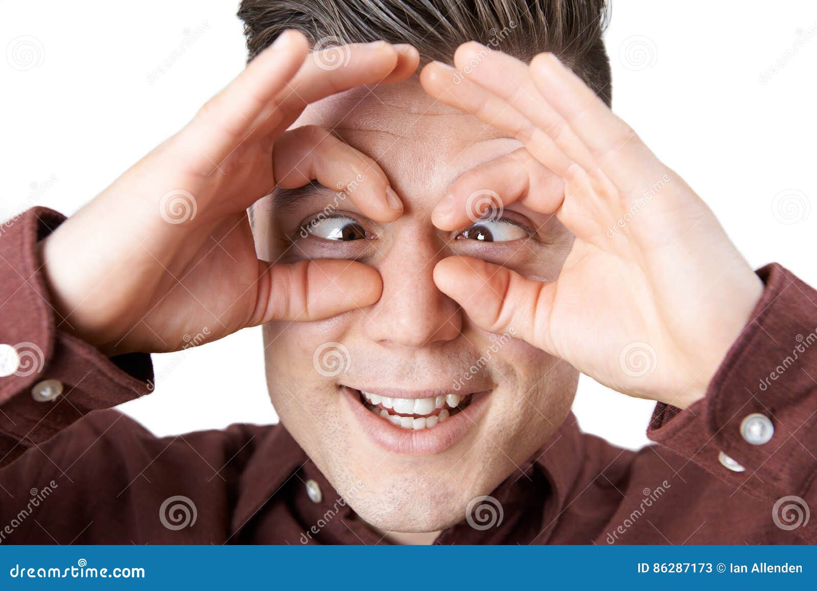 Studio Shot of Man Making Spectacle Shape with His Hands Stock Image ...