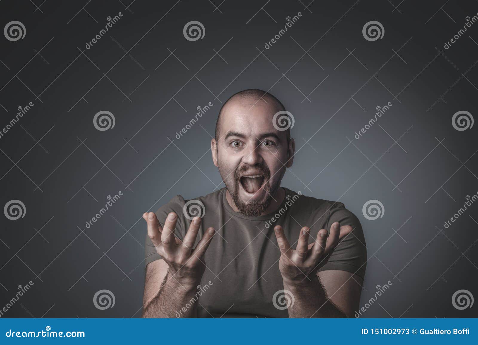 Studio Shot of a Man with a Surprised and Enthusiastic Expression Stock ...