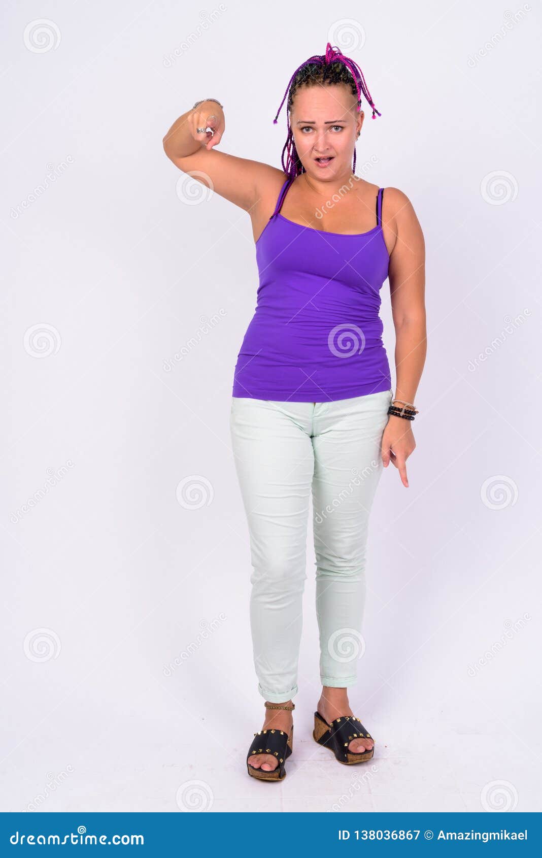 Full Body Shot Of Angry Rebellious Woman Pointing At Camera Stock Image
