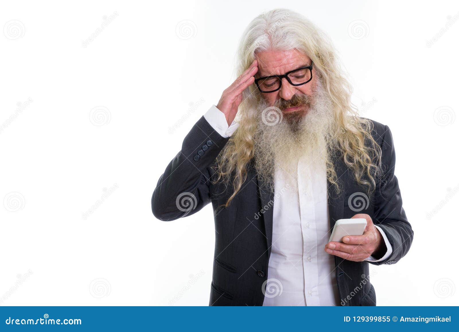 Studio Shot of Senior Bearded Businessman Having Headache while Stock ...
