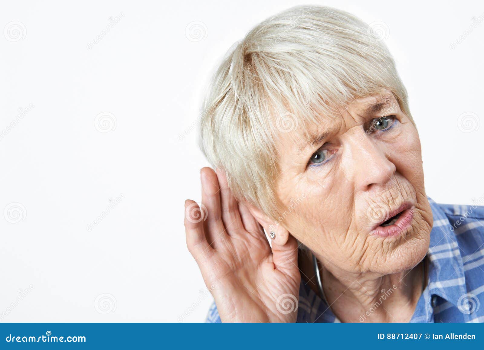 Studio Shot of Senior Woman Suffering from Deafness Stock Image - Image ...