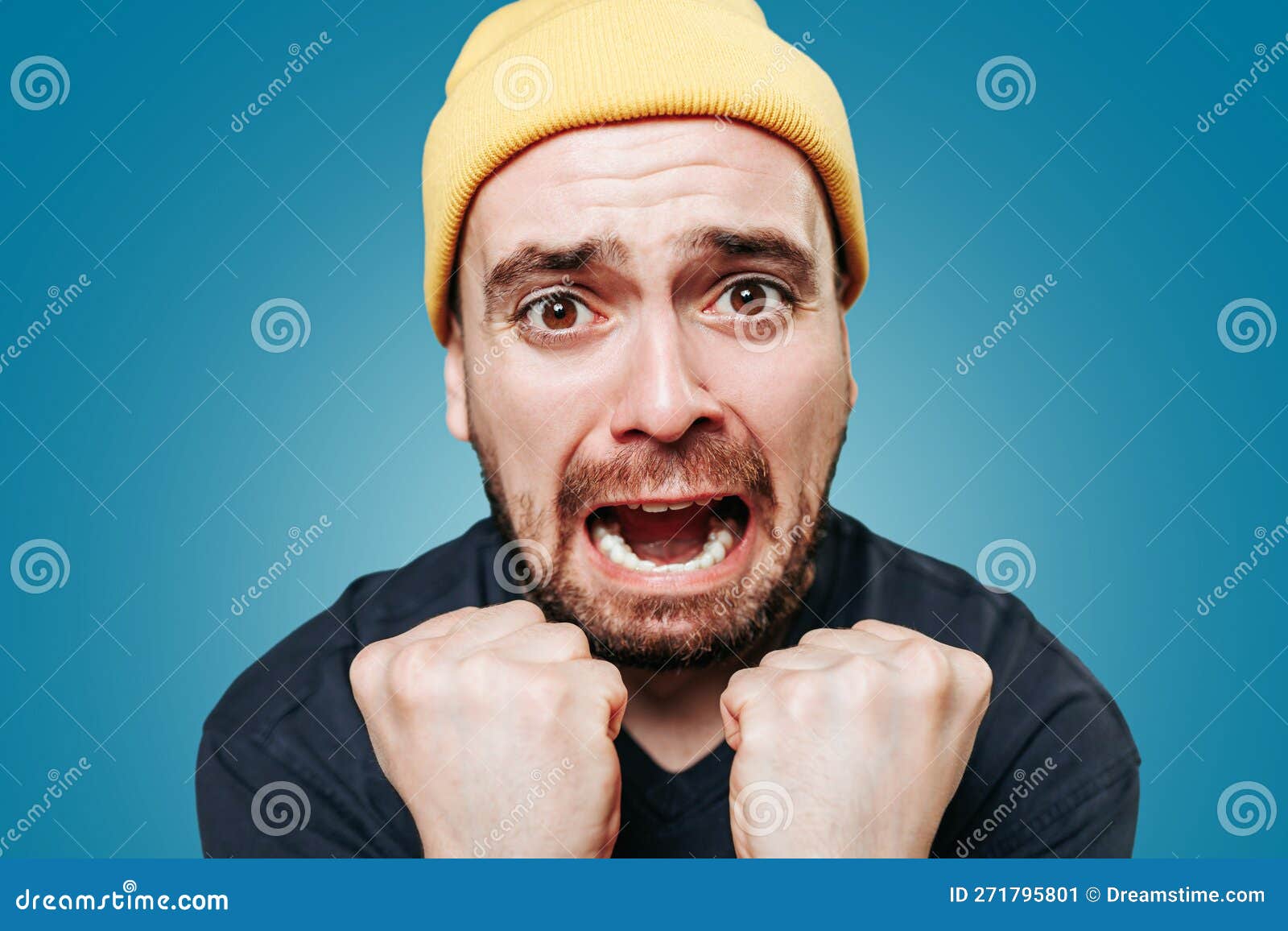 A Studio Shot of a Shouting Guy, His Expression One of Anger and ...