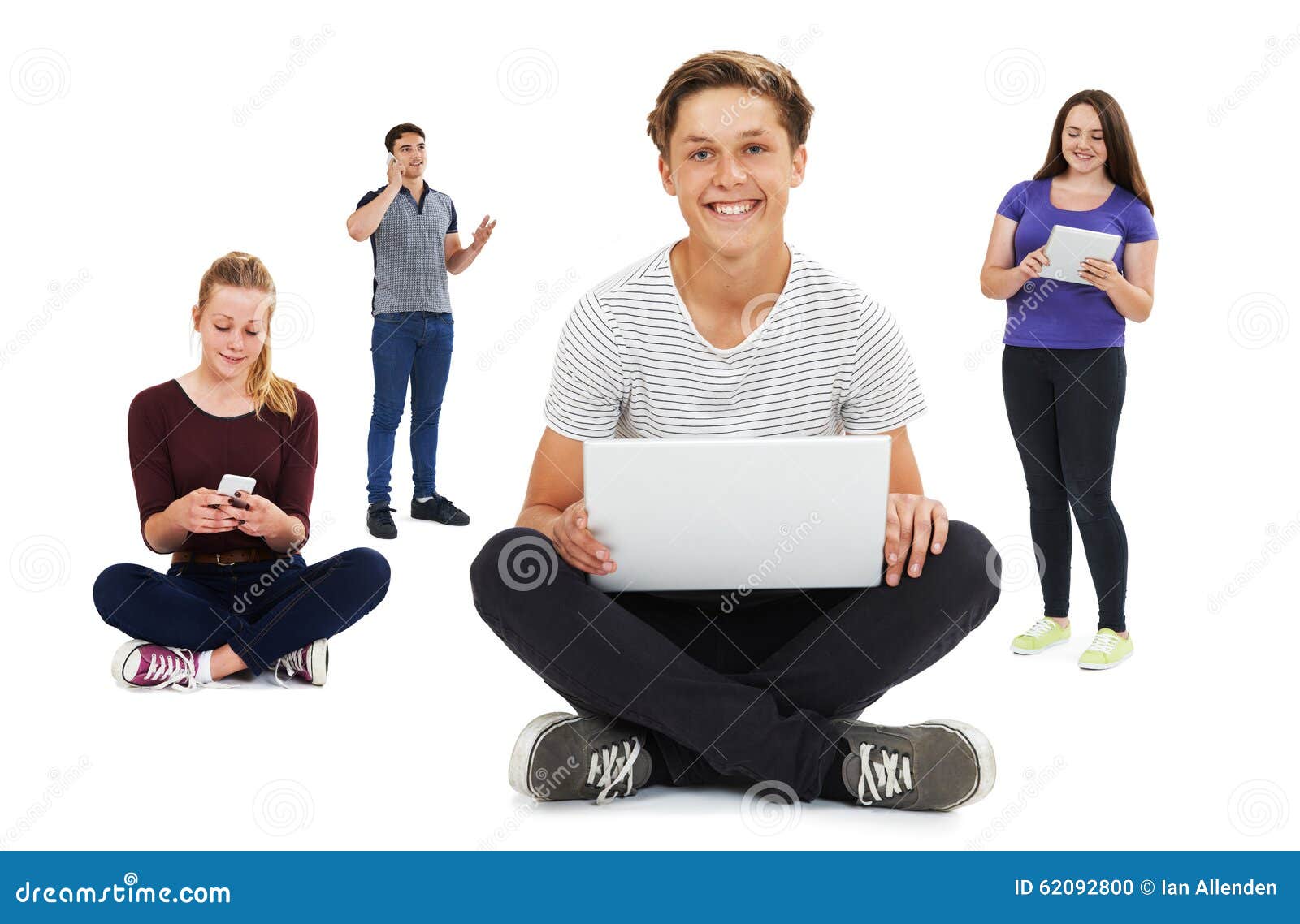Studio Shot of Teenagers Using Communication Technology Stock Photo ...
