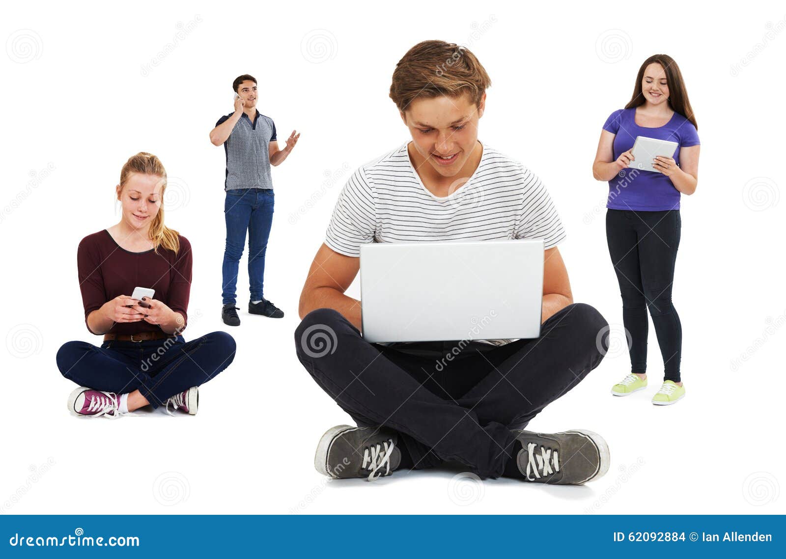 Studio Shot of Teenagers Using Communication Technology Stock Photo ...