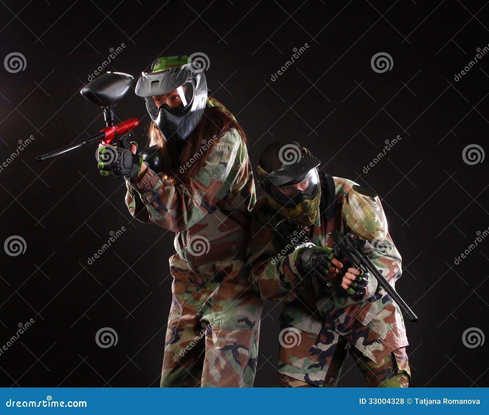 Studio Shot of Two Paintball Players Stock Photo - Image of cylinder ...