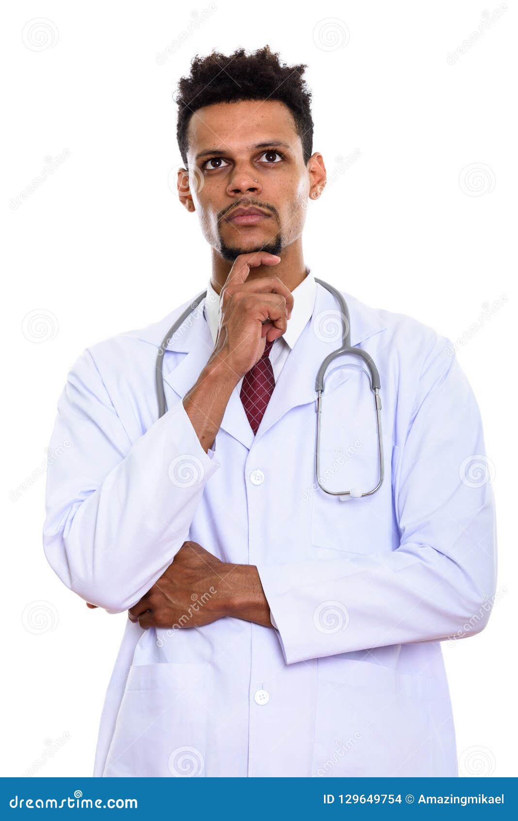 Studio Shot of Young African Man Doctor Thinking while Looking U Stock ...