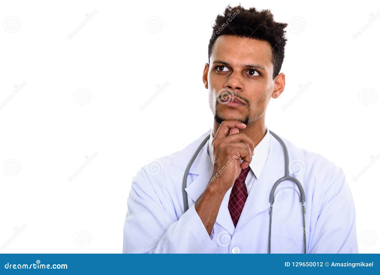 Studio Shot of Young African Man Doctor Thinking while Looking U Stock ...