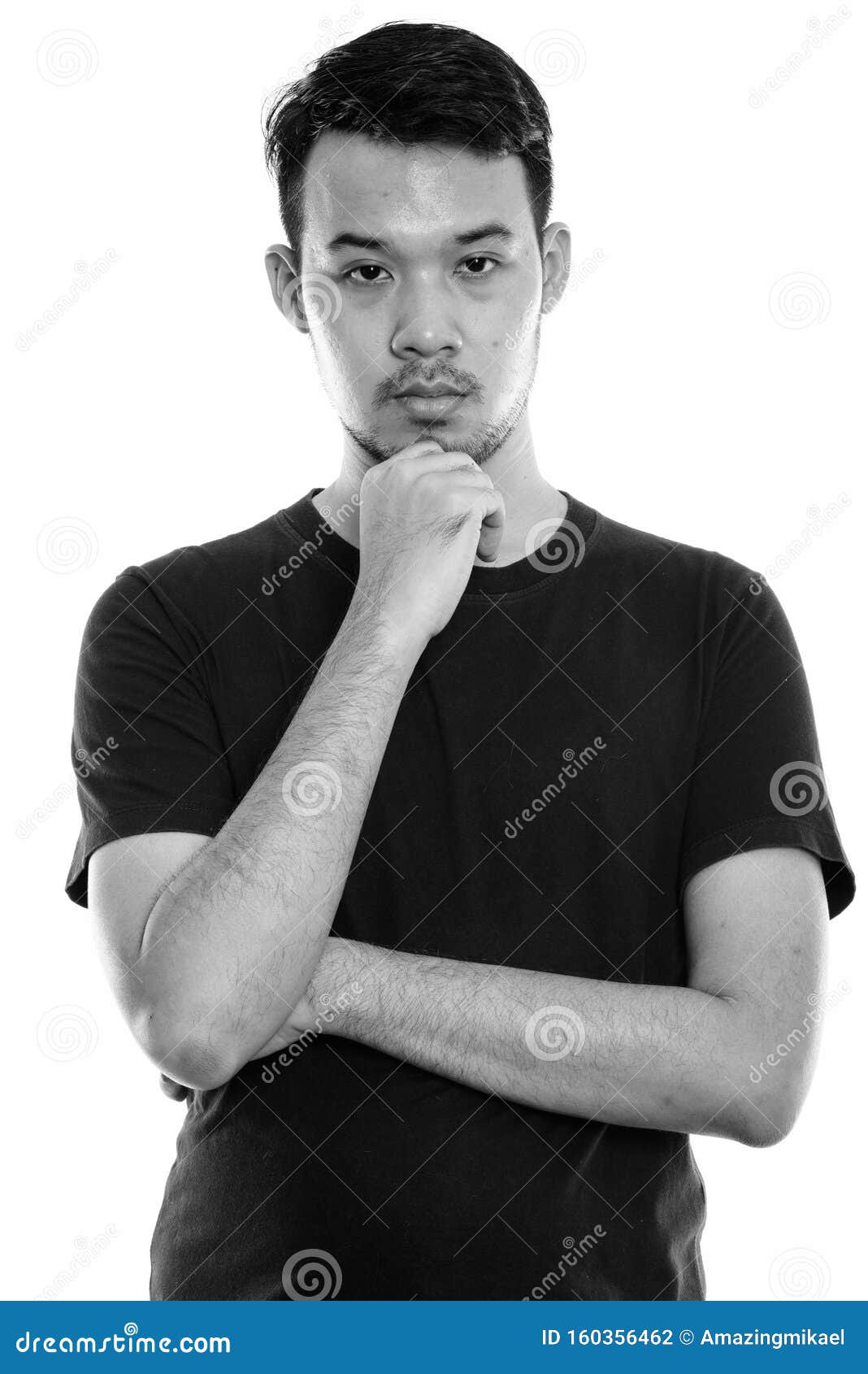 Studio Shot of Young Asian Man Thinking Stock Photo - Image of looking ...